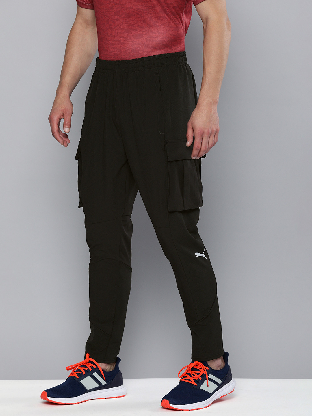 Buy Puma Men Black Solid DryCELL Woven Cargo Running Track Pants ...
