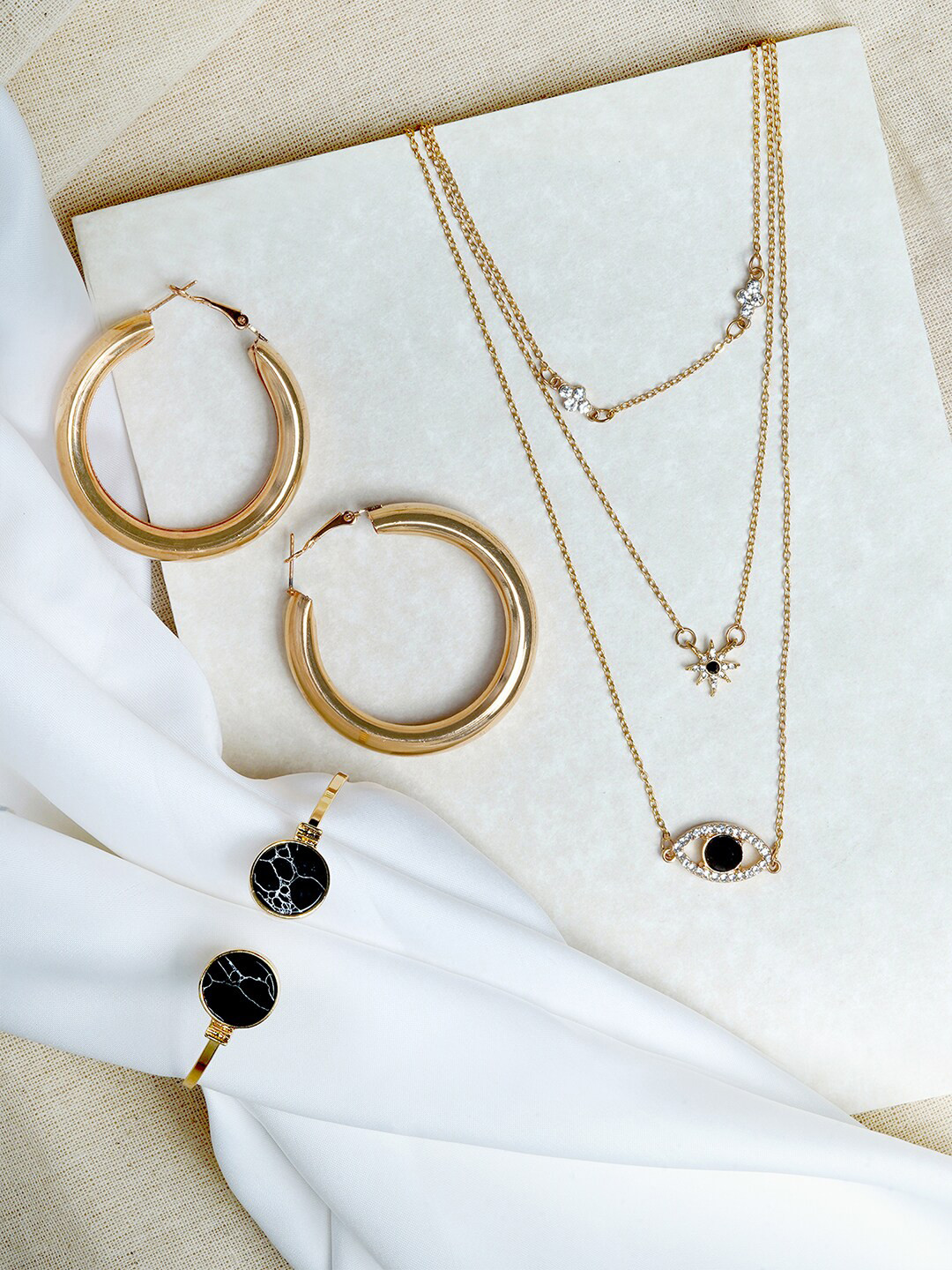 Buy JOKER & WITCH Gold Plated White Stone Studded Layered Jewellery Set ...