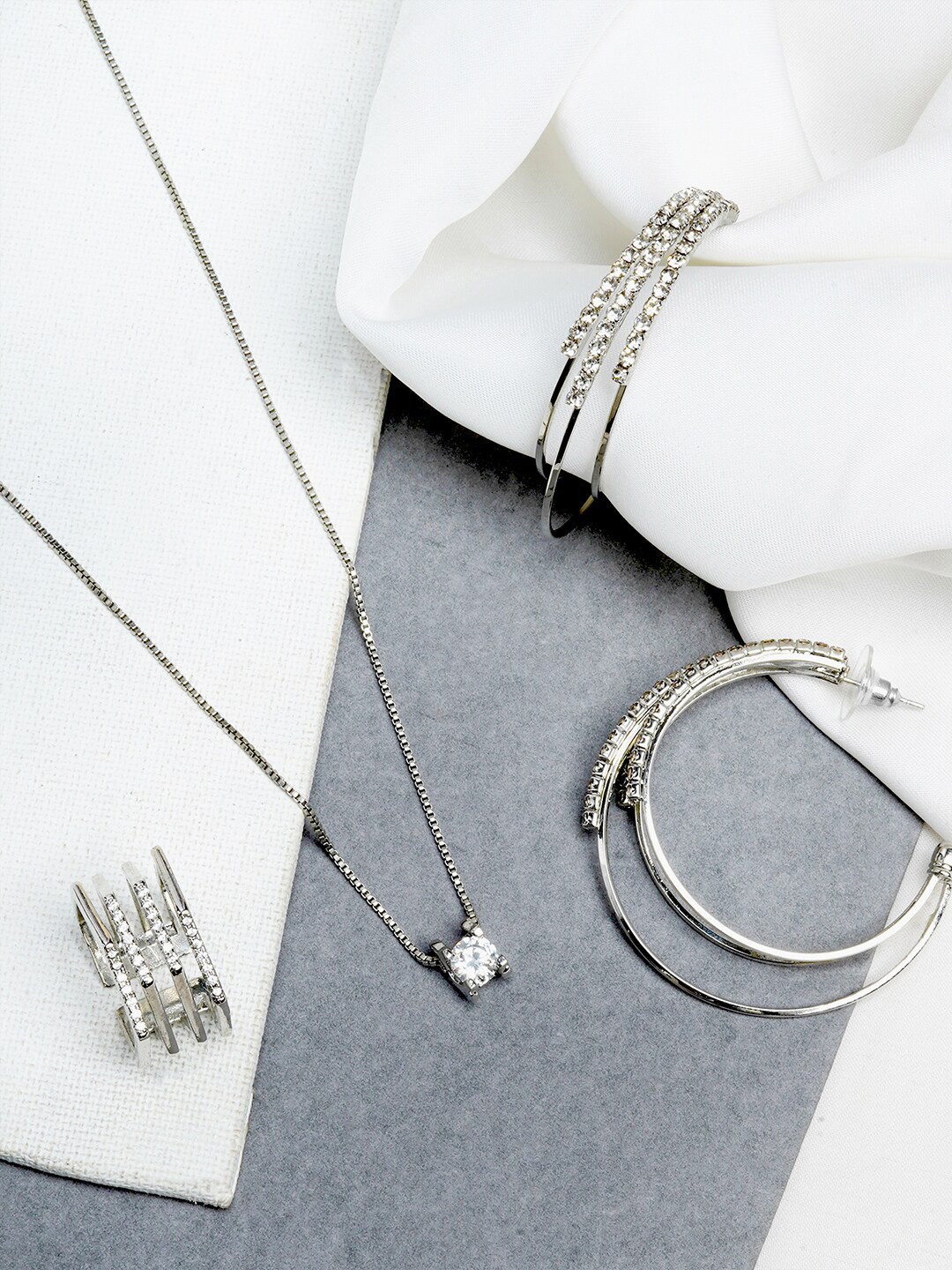 Buy JOKER & WITCH Silver Plated White Stone Studded Cashmere Jewellery ...