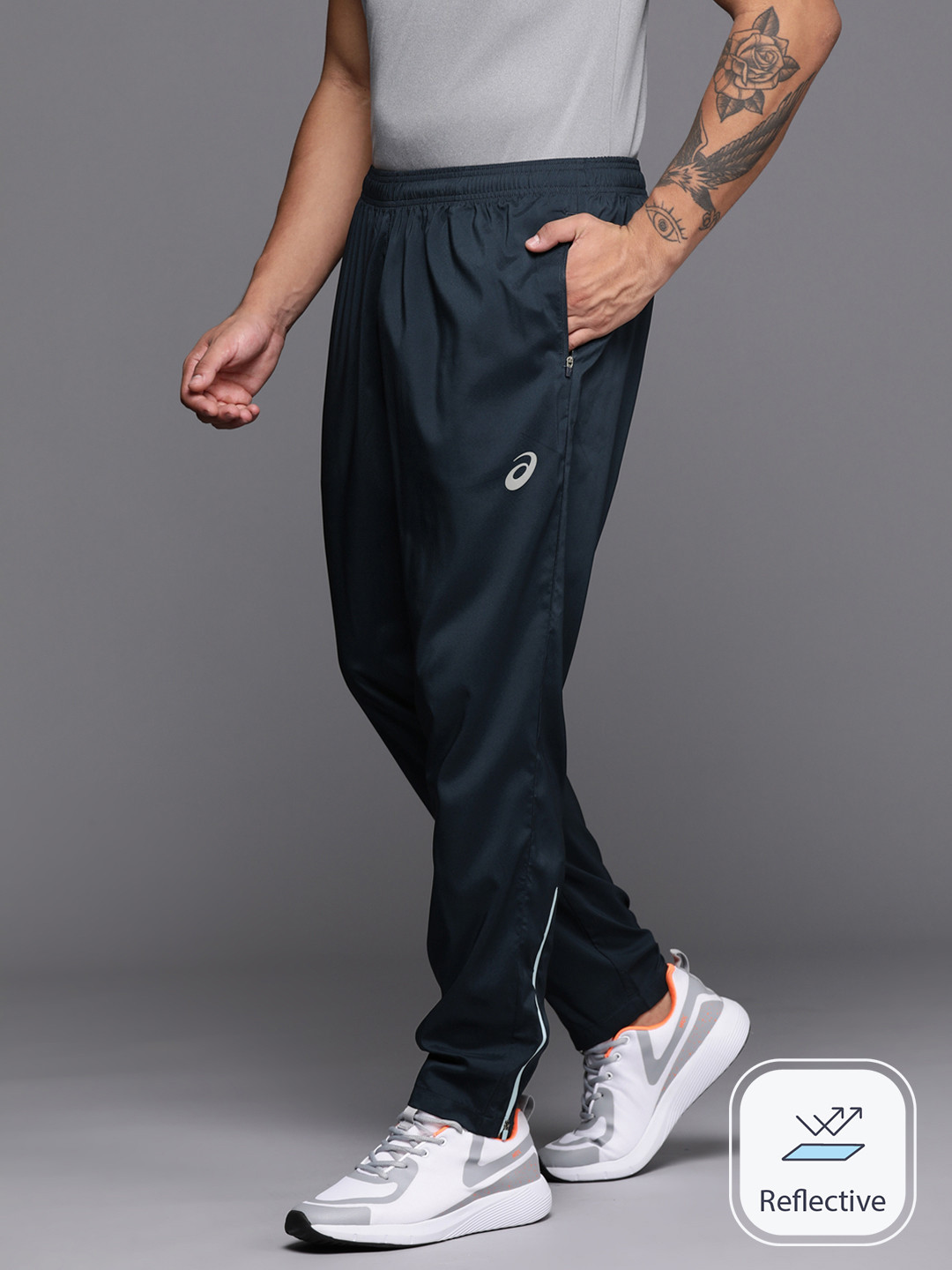 Buy ASICS Men Zip Bottom Woven Solid Running Track Pants - Track Pants ...