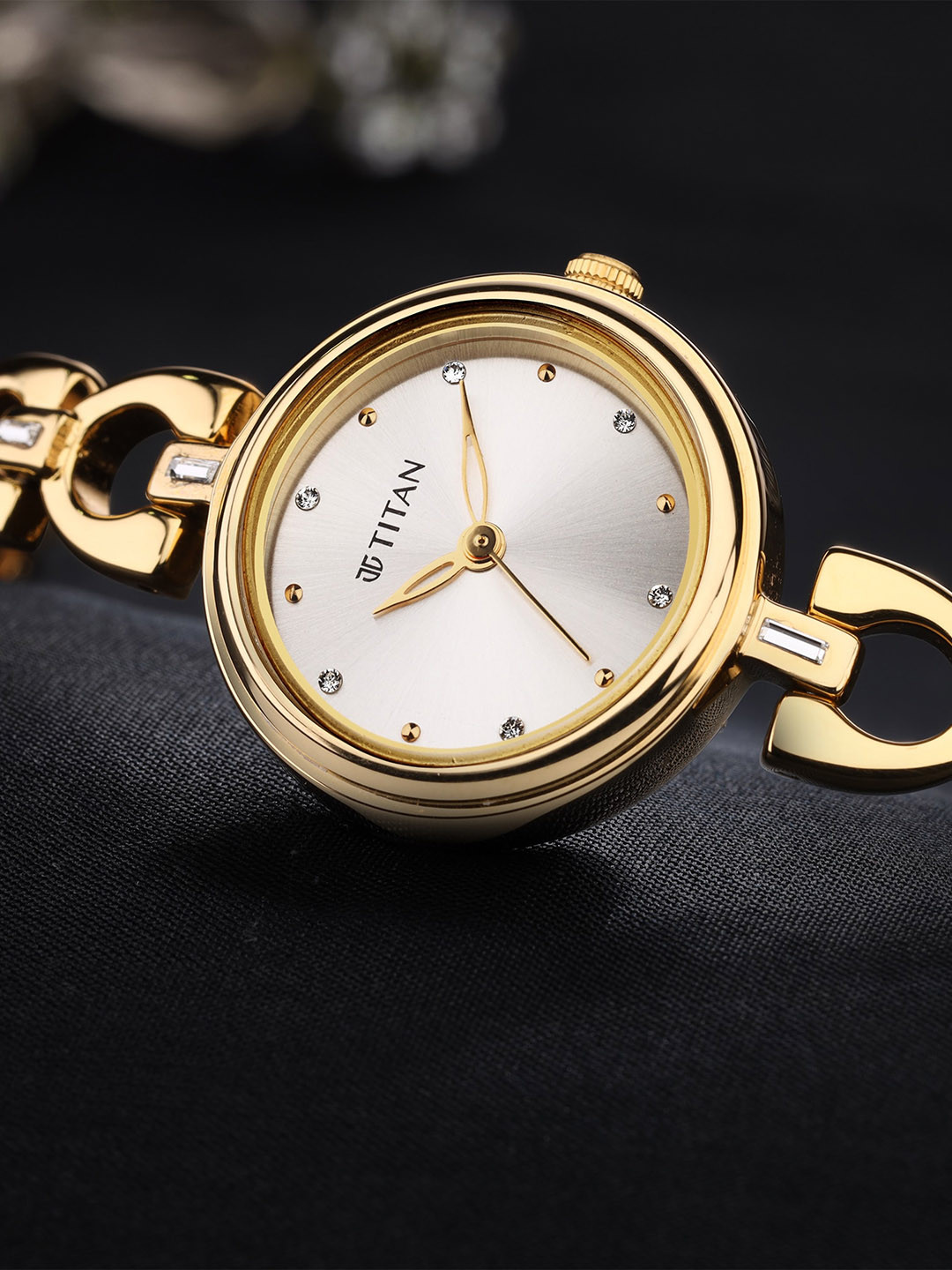 Buy Titan Women Silver Toned Brass Dial & Gold Toned Bracelet Style ...