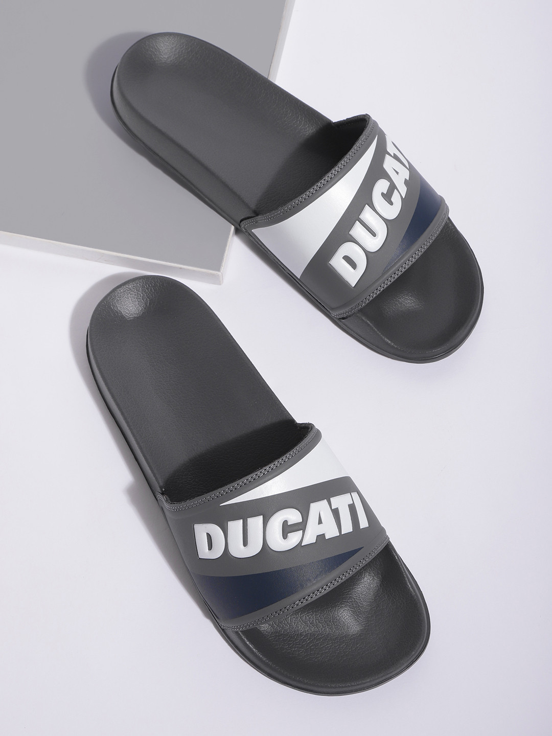 Buy Ducati Men Grey & White Brand Logo Embossed Sliders - Flip Flops ...