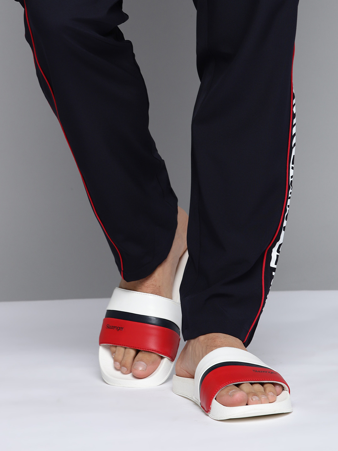 Buy Slazenger Men Red & White Colourblocked Sliders - Flip Flops for ...