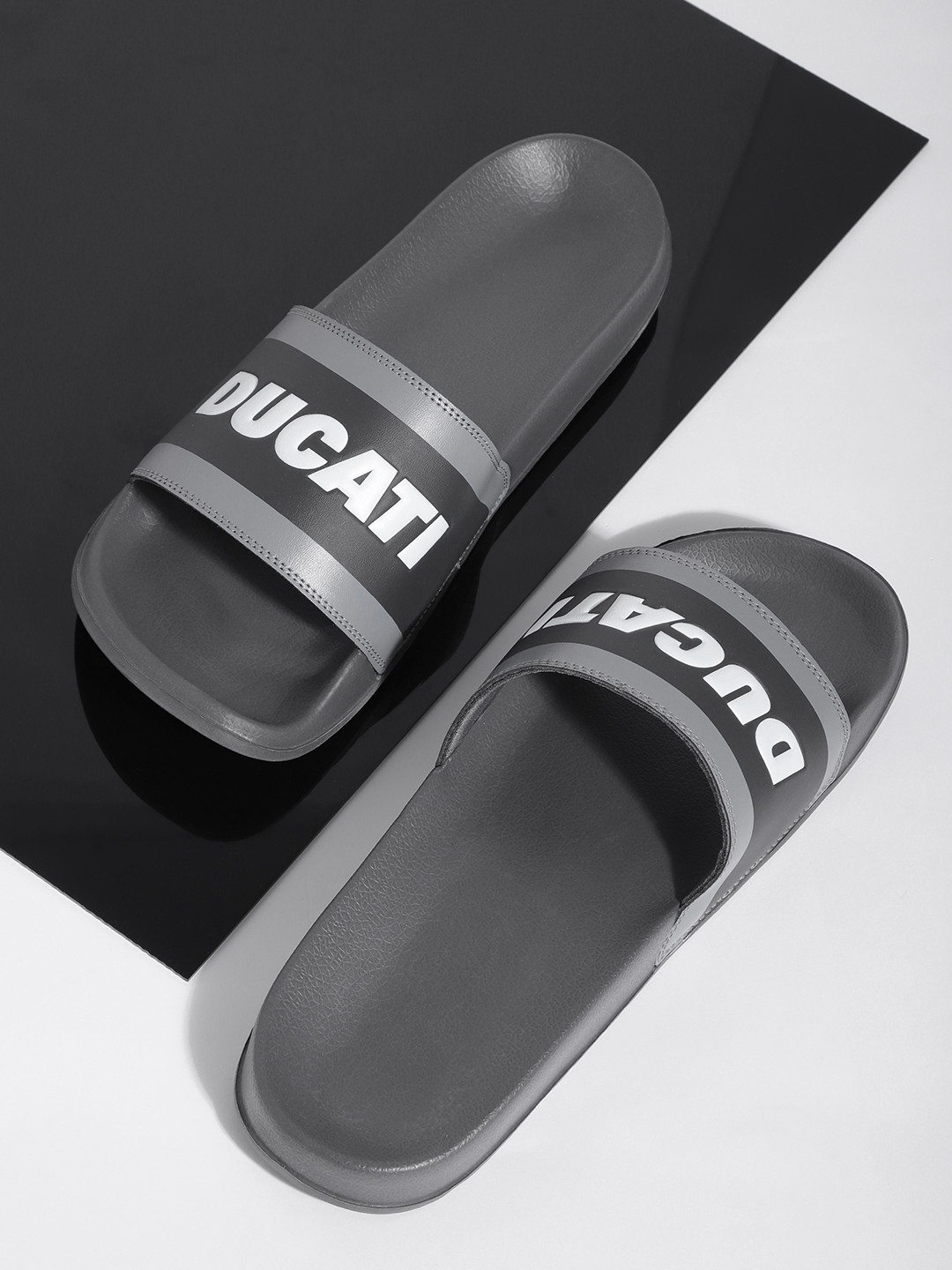 Buy Ducati Men Black & White Brand Logo Embossed Sliders - Flip Flops ...
