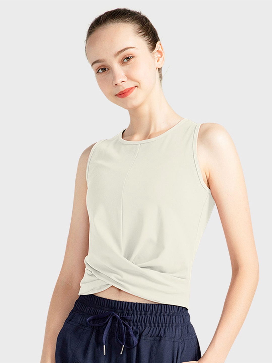 Buy Urbanic Beige Solid Regular Crop Twisted Top Tops For Women