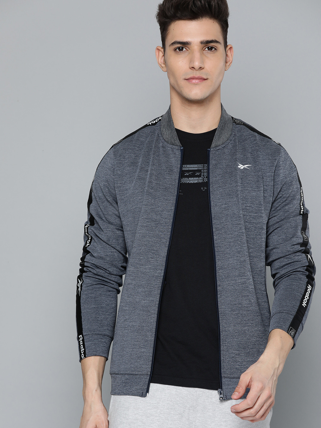 Buy Reebok Men Navy Blue Solid Speedwick Training Jacket - Jackets for ...
