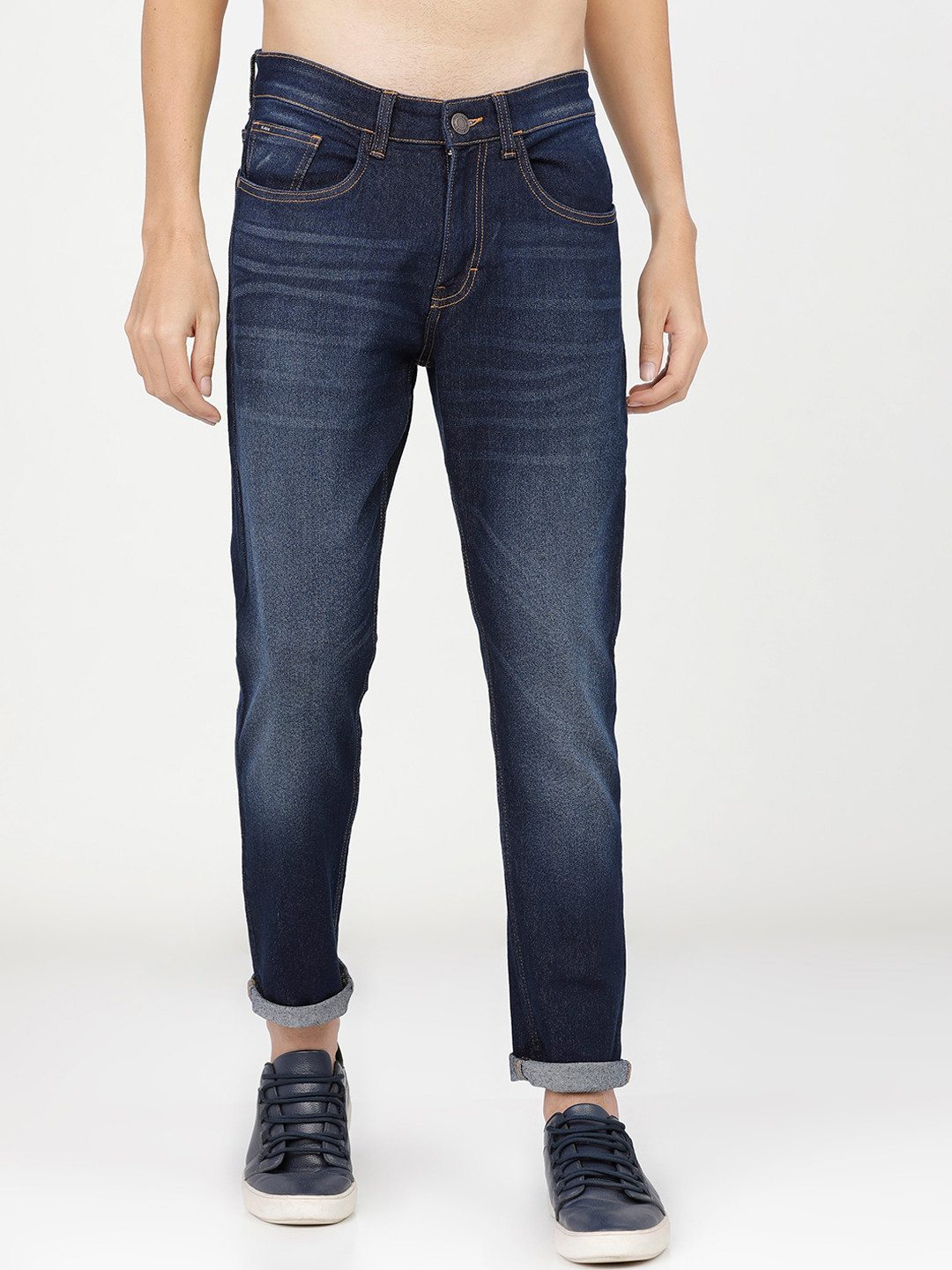 Buy HIGHLANDER Men Blue Tapered Fit Heavy Fade Stretchable Jeans ...