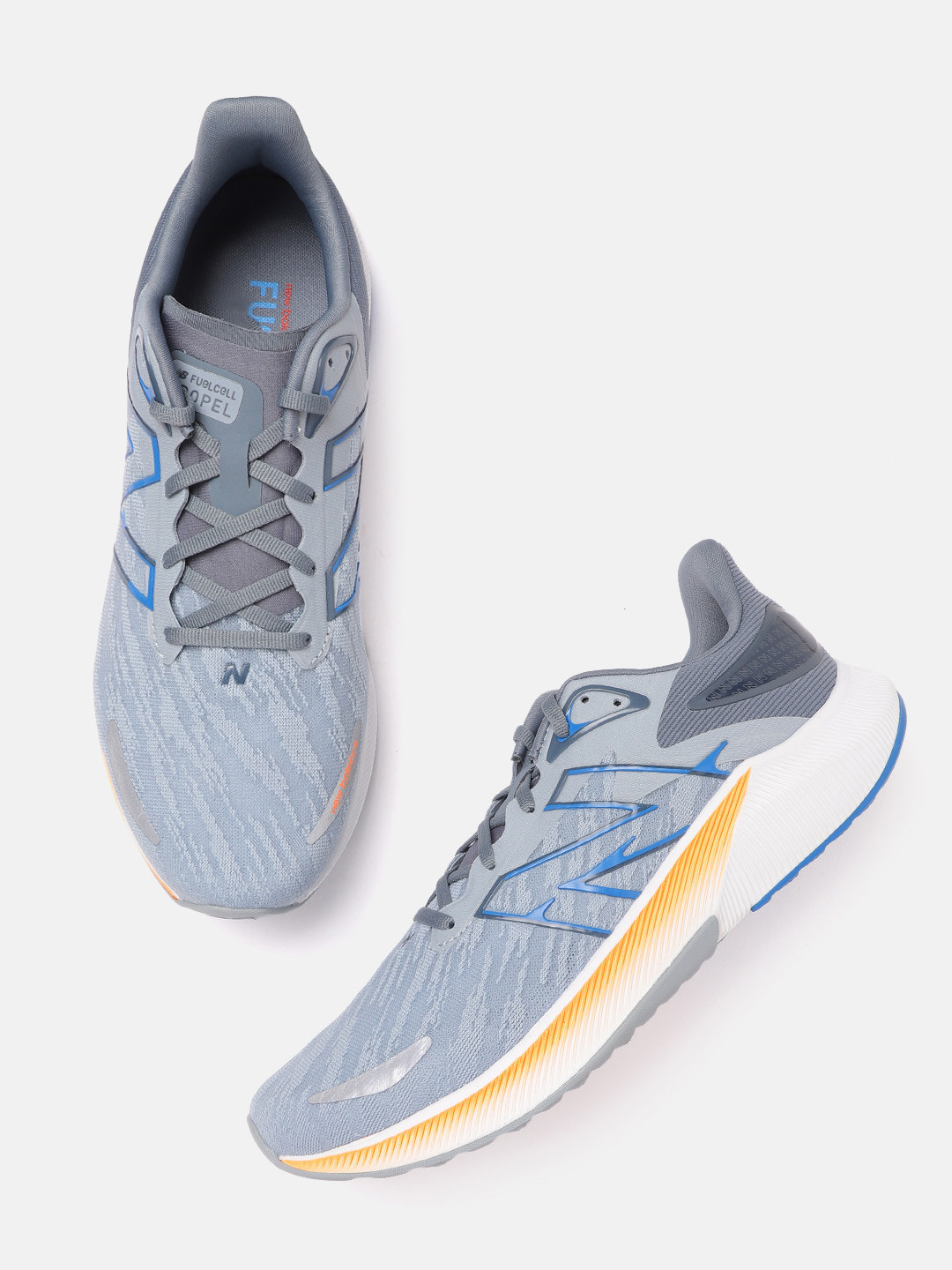 Buy New Balance Men Blue Woven Design Running Shoes - Sports Shoes for ...