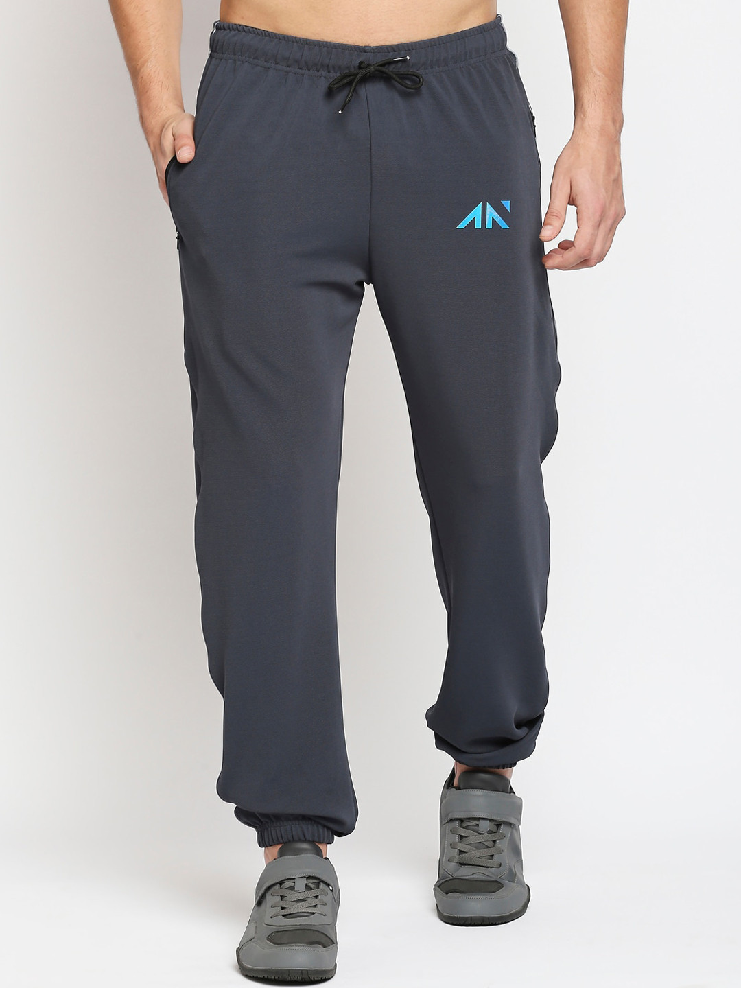 Buy AESTHETIC NATION Men Grey Solid Joggers - Track Pants for Men ...