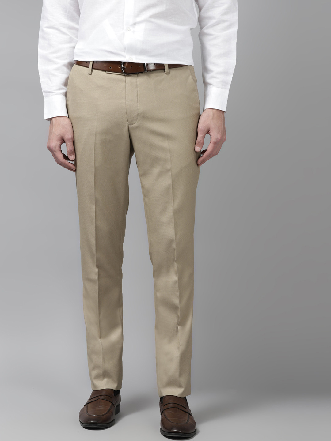 Buy Arrow Men Beige Solid Tapered Fit Trousers - Trousers for Men ...