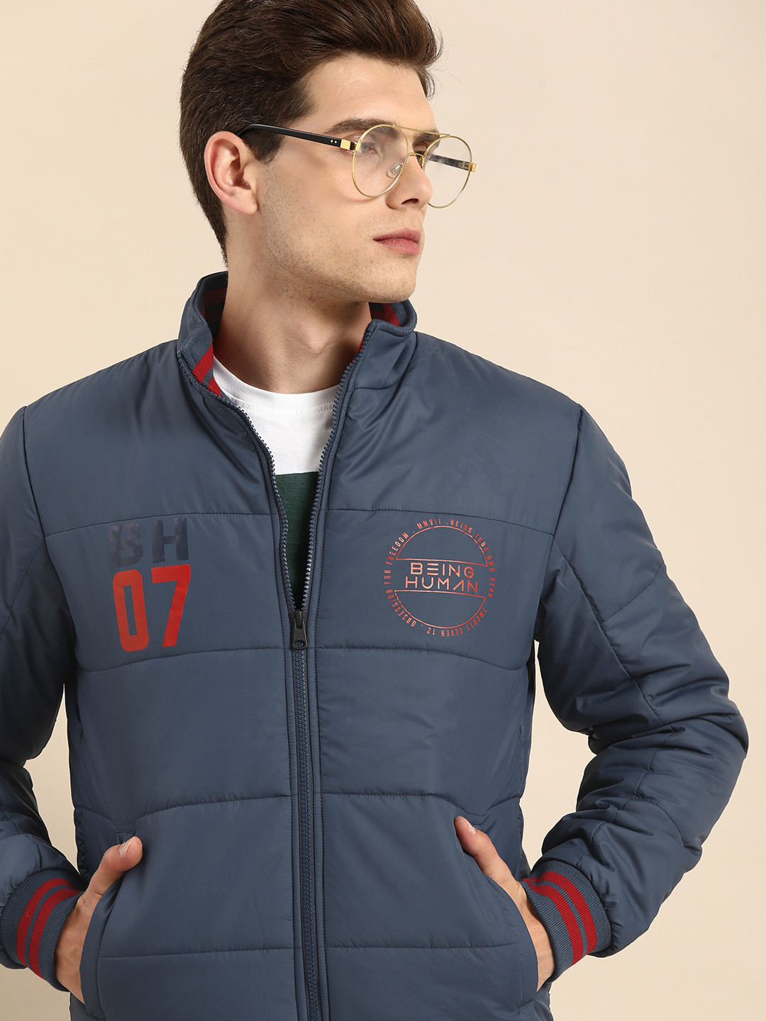 Buy Being Human Men Navy Blue Padded Varsity Jacket With Printed ...