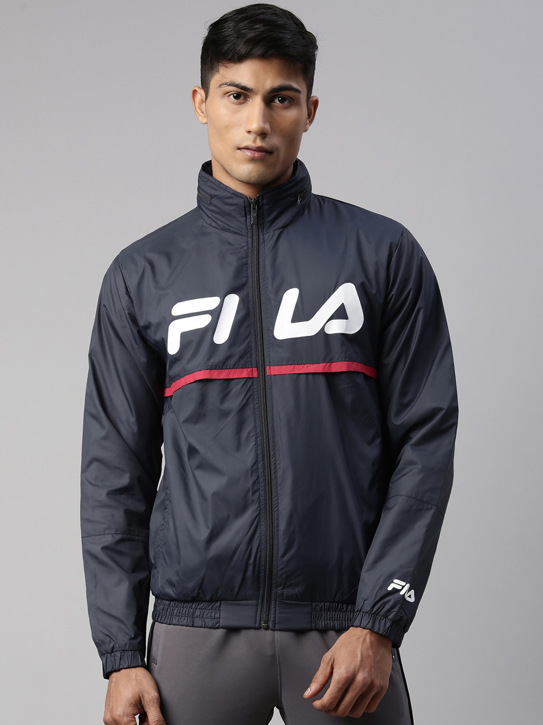 Buy FILA Men Navy Blue Brand Logo Running Sporty Jacket - Jackets for ...