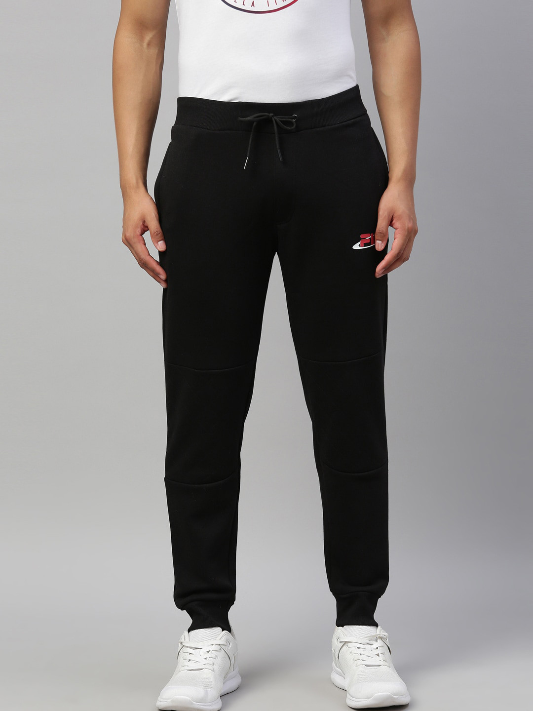 Buy FILA Men Black Solid Joggers - Track Pants for Men 16218712 | Myntra