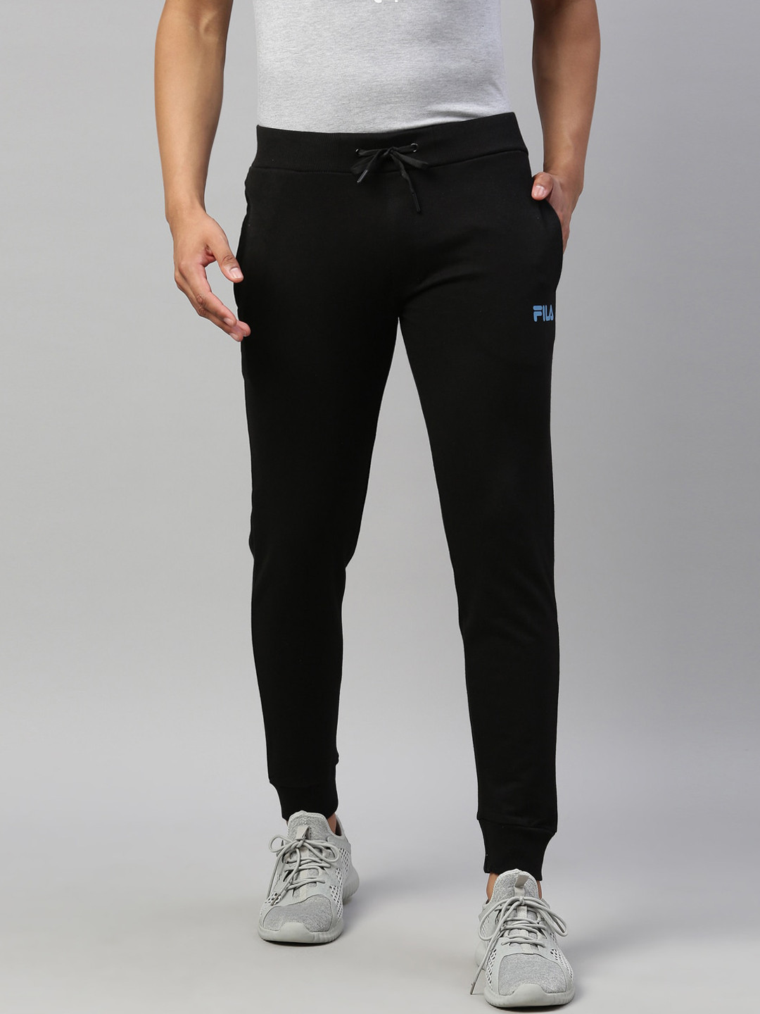 Buy FILA Men Black Solid Pure Cotton Joggers - Track Pants for Men ...