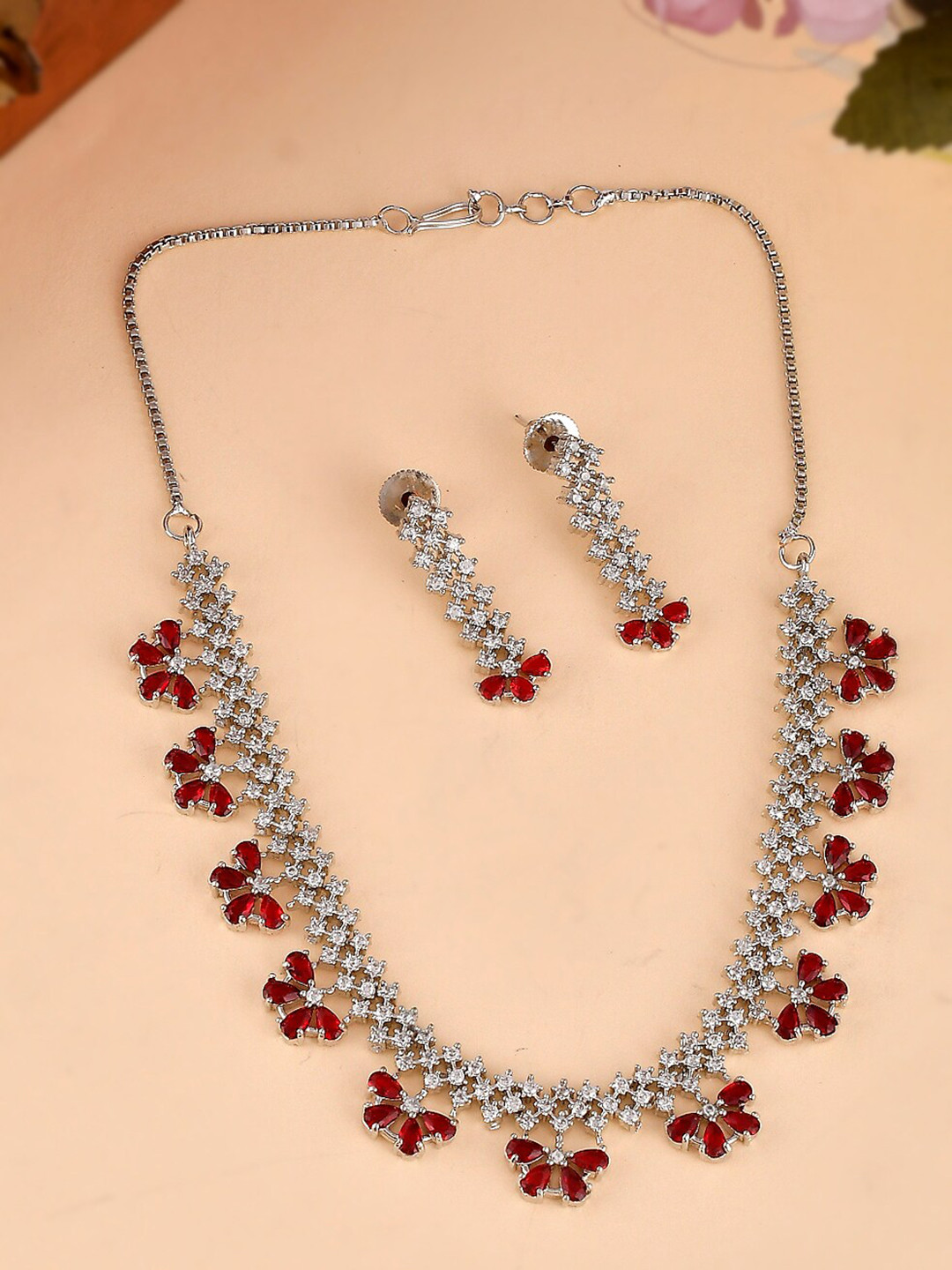 Buy Shoshaa Gold Plated Maroon & White CZ Studded Jewellery Set ...