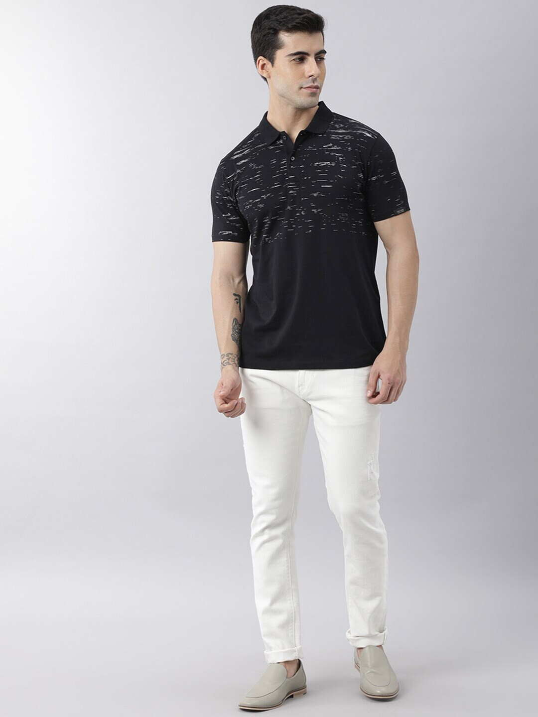 Buy RARE RABBIT Men Rings 4 Slim Fit Solid Polo Collar T Shirt ...