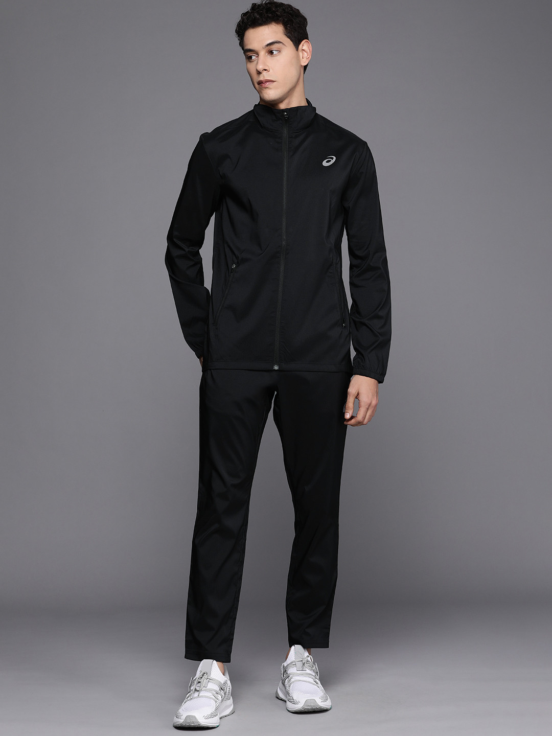 Buy ASICS Men Black Solid Basic Tracksuit - Tracksuits for Men 16893750 | Myntra