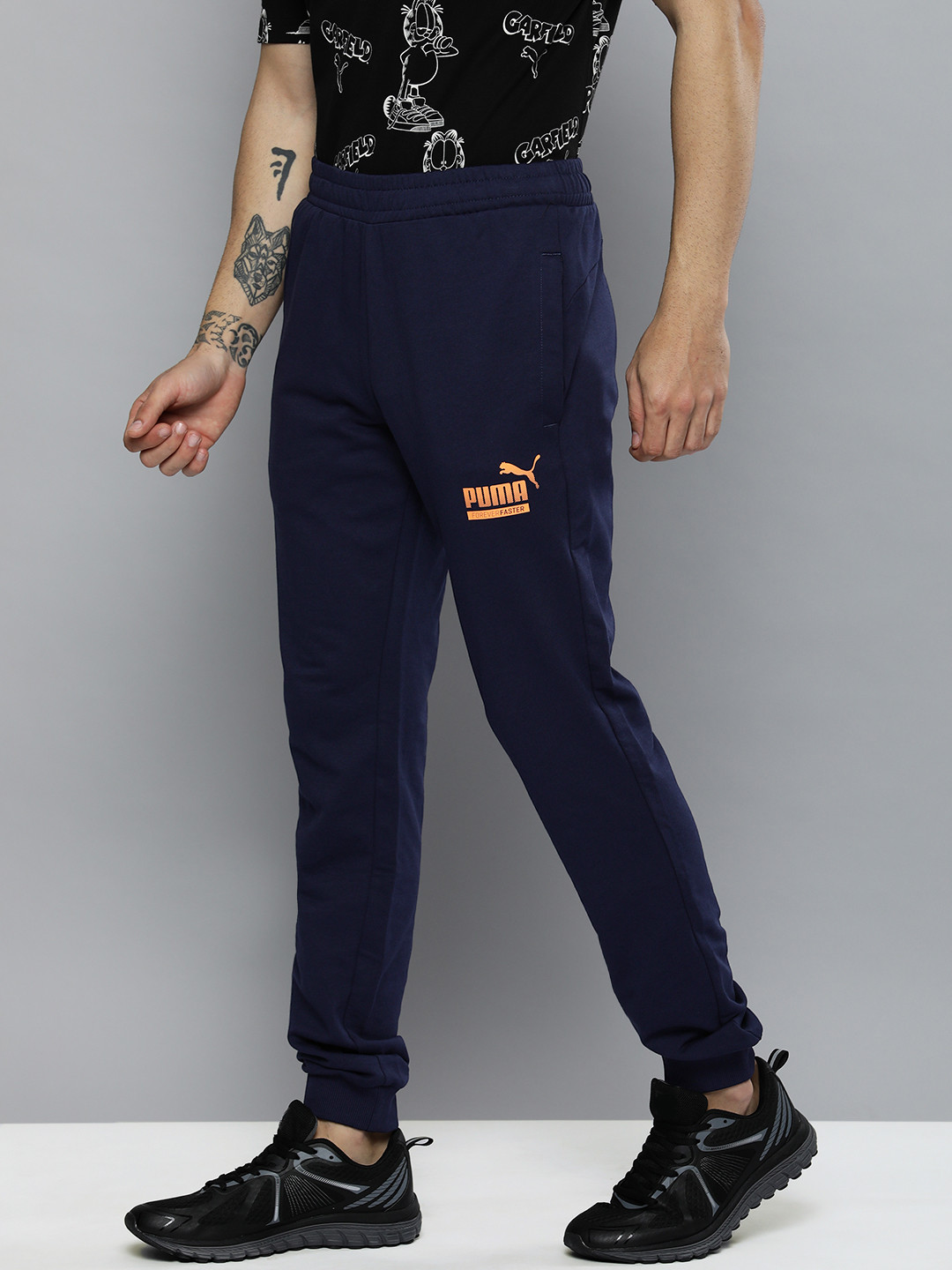 Buy Puma Men Blue Brand Logo Print Slim Fit Mid Rise Waist Casual ...