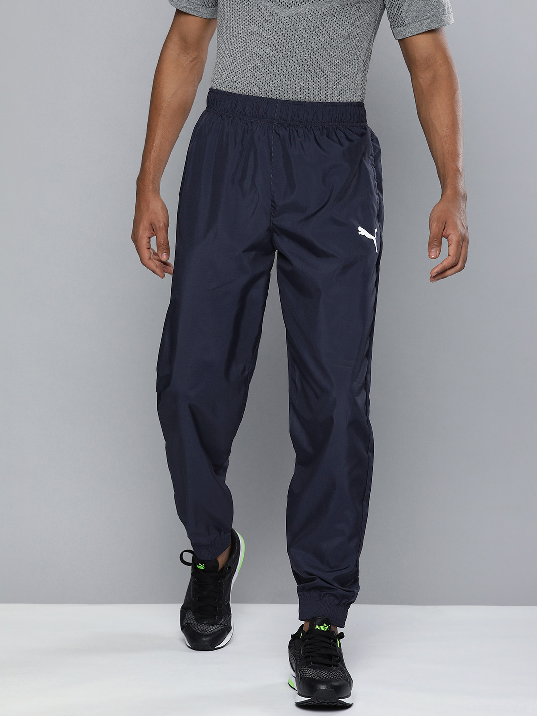 Buy Puma Men Navy Blue Solid Woven Training Joggers With PUMA Logo ...
