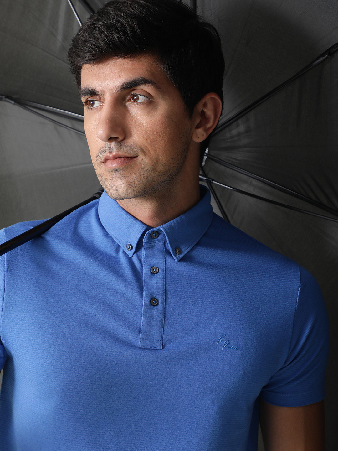 Buy RARE RABBIT Men Rings 4 Slim Fit Solid Polo Collar T Shirt ...