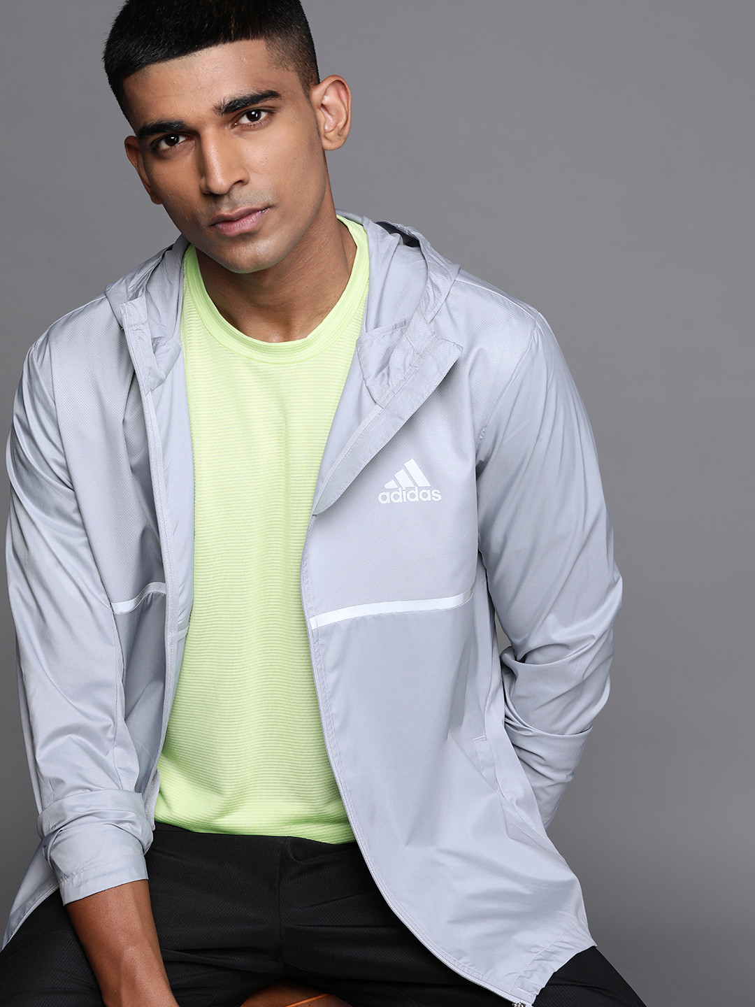 Buy ADIDAS Men Grey Own The Run JKT Solid Hooded Water Repellent ...