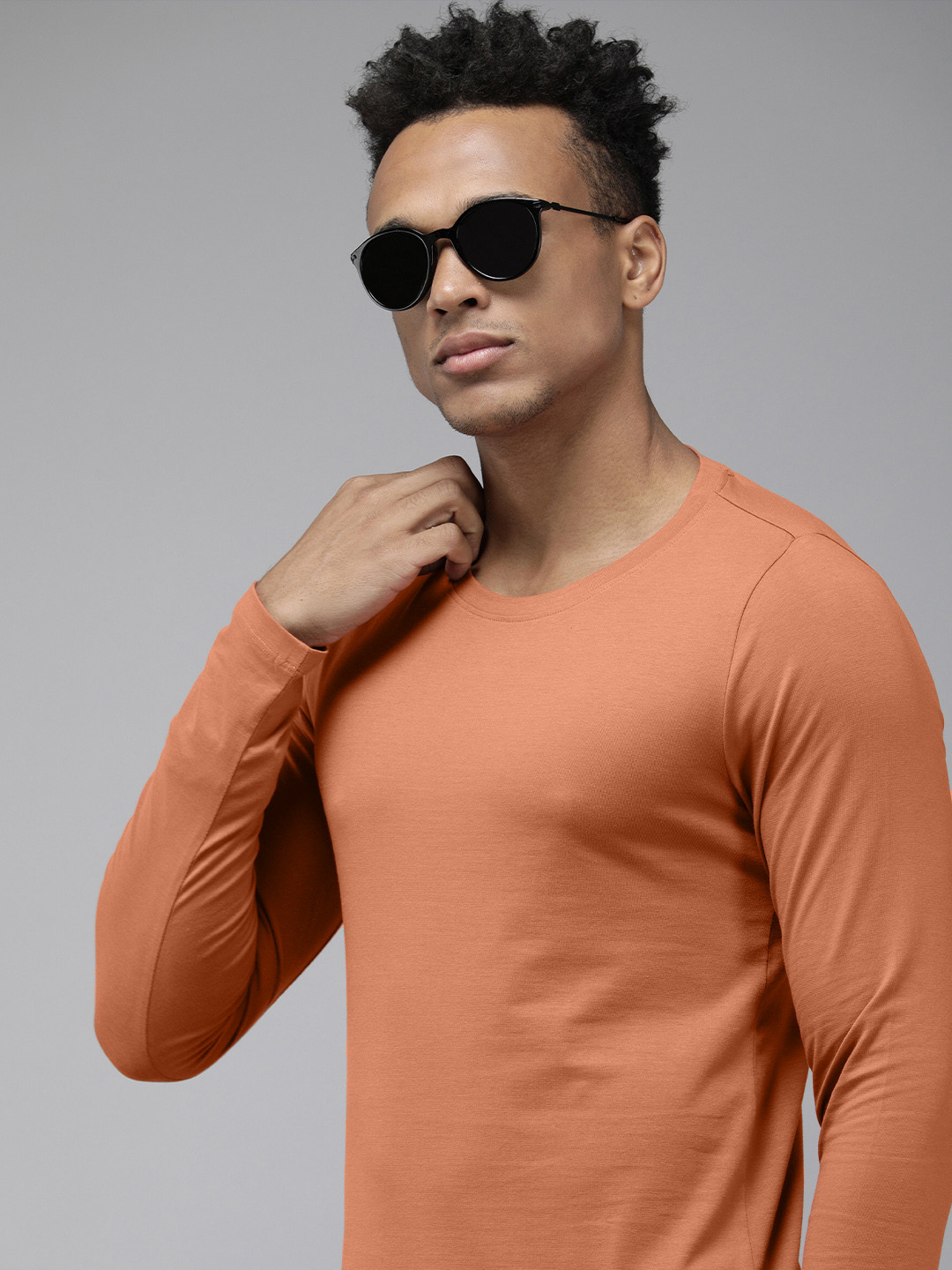 Buy Roadster Men Rust Orange Solid Round Neck Regular Fit Casual Muscle ...