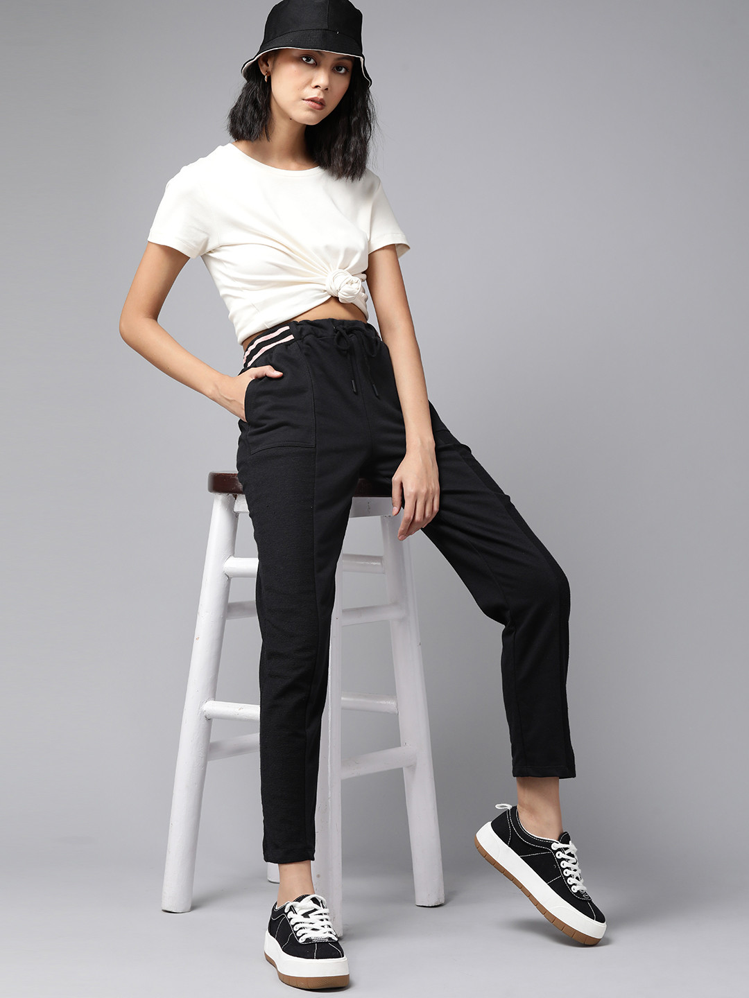 Buy The Roadster Lifestyle Co. Women Black Solid Relaxed Fit Track ...