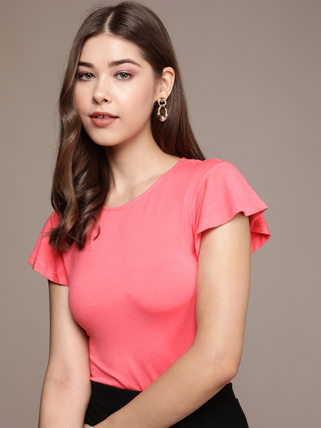 Buy Bebe Women Paradise Coral Essential Solid Flutter Sleeves Top ...