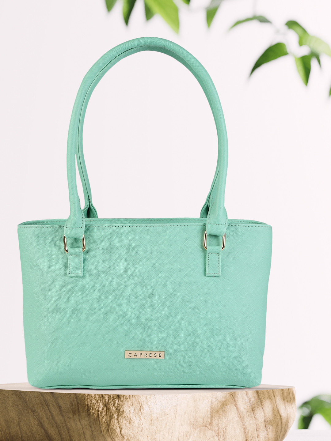 Buy Caprese Sea Green Textured Leather Structured Shoulder Bag ...