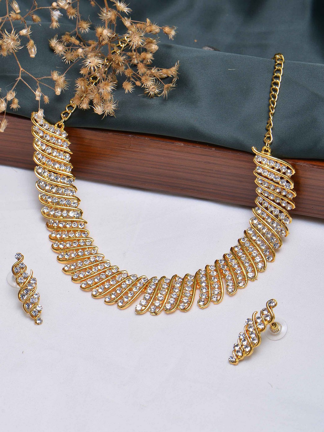 Buy POPLINS Gold Toned & White Stone Studded Jewellery Set - Jewellery ...