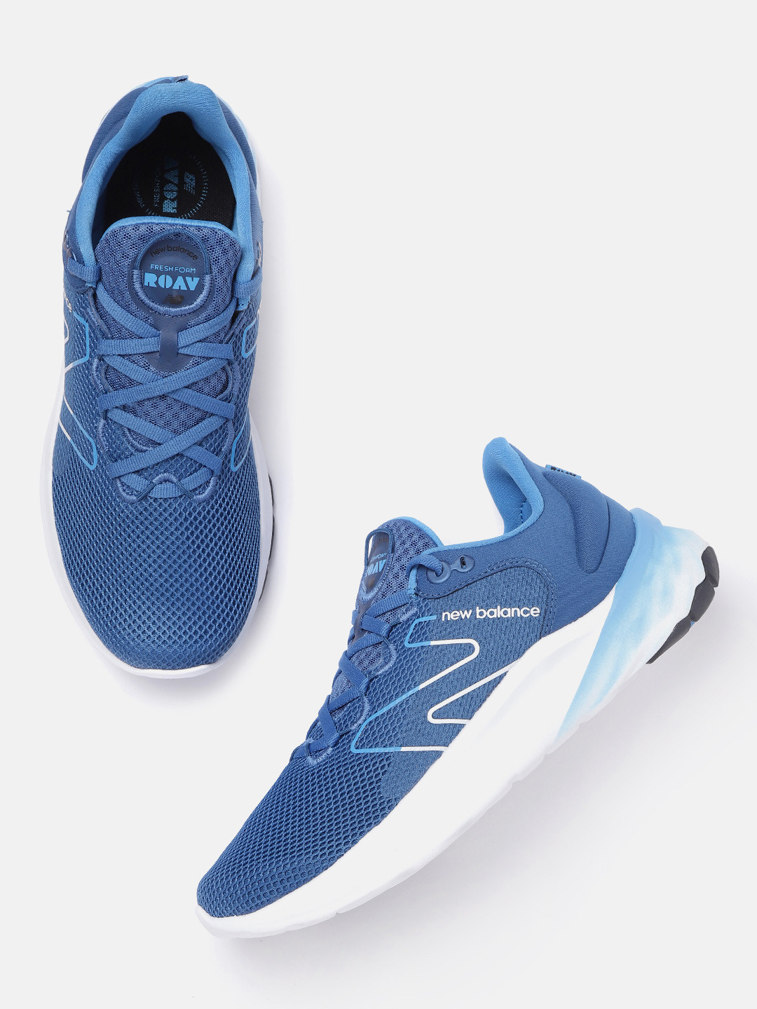 Buy New Balance Men Blue & White Woven Design Roav Running Shoes ...