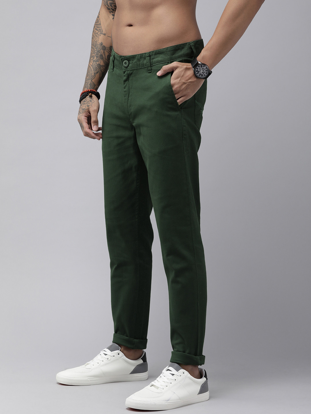 Buy Roadster Men Dark Green Straight Fit Solid Trousers - Trousers for ...