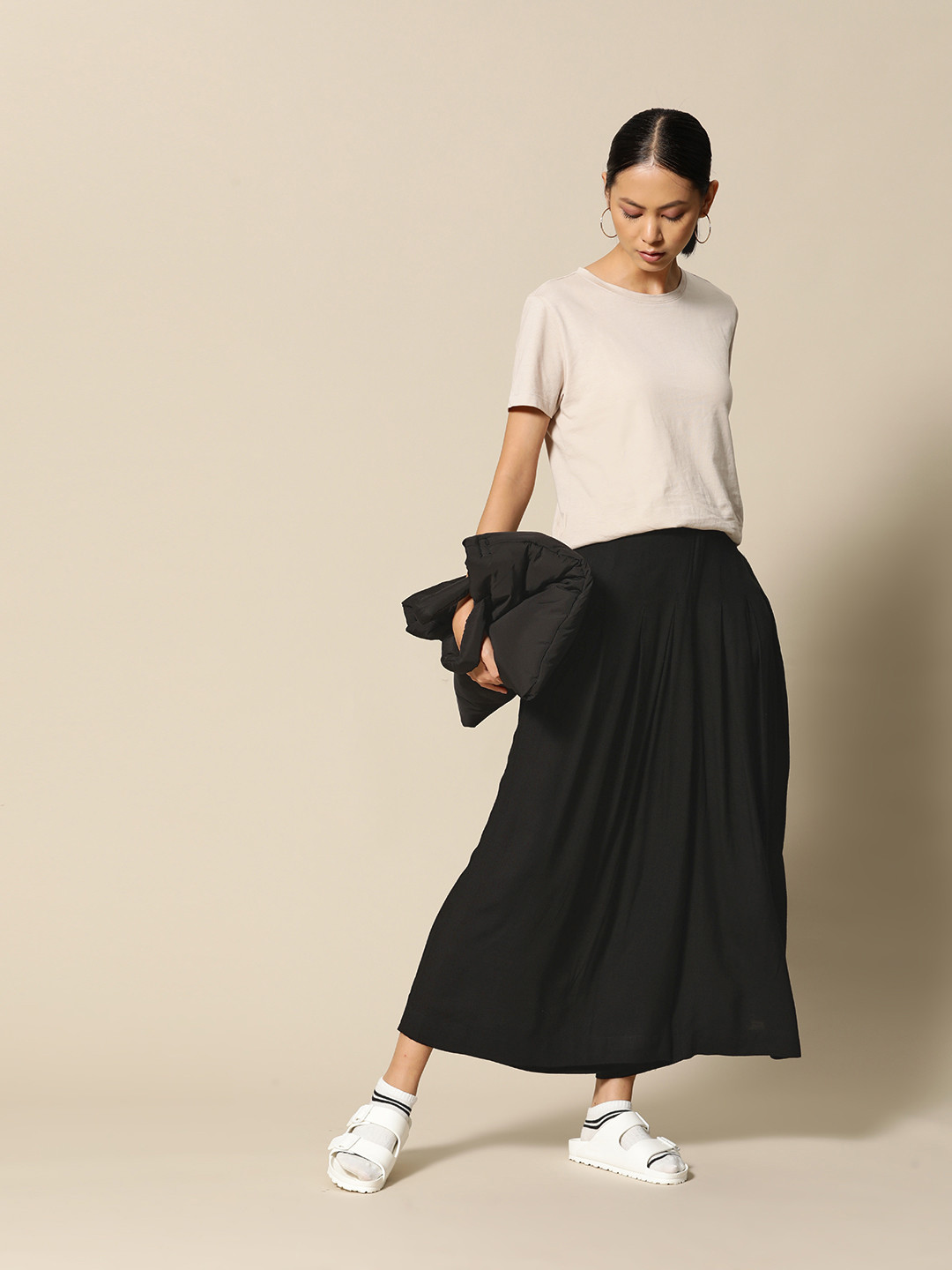 Buy BOWER Women Black Solid Mid Rise Pleated Flared Trousers With ...