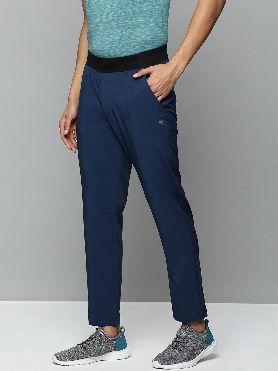Buy Skechers Men Navy Blue Solid GOWALK ACTION Track Pants - Track ...