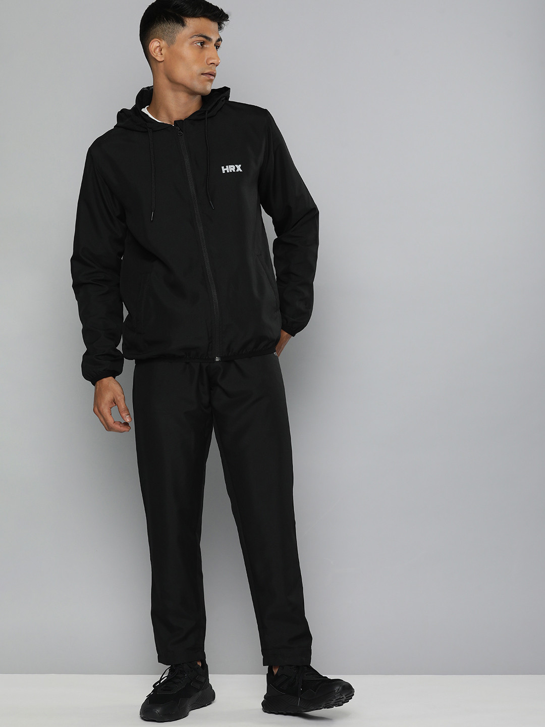Buy HRX By Hrithik Roshan Men Black Brand Logo Printed Rapid Dry ...