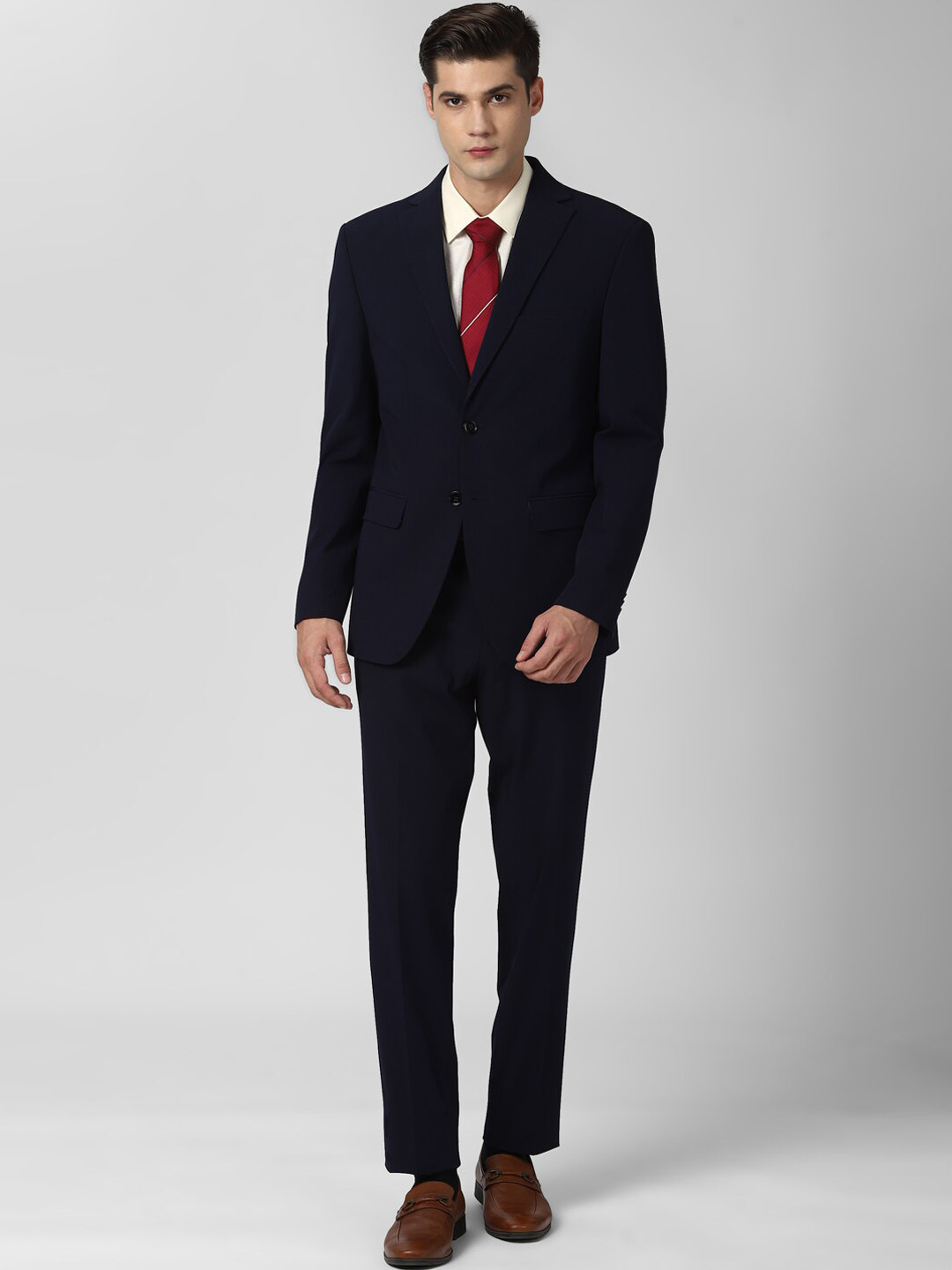 Buy Peter England Elite Men Navy Blue Solid Single Breasted Slim Fit ...