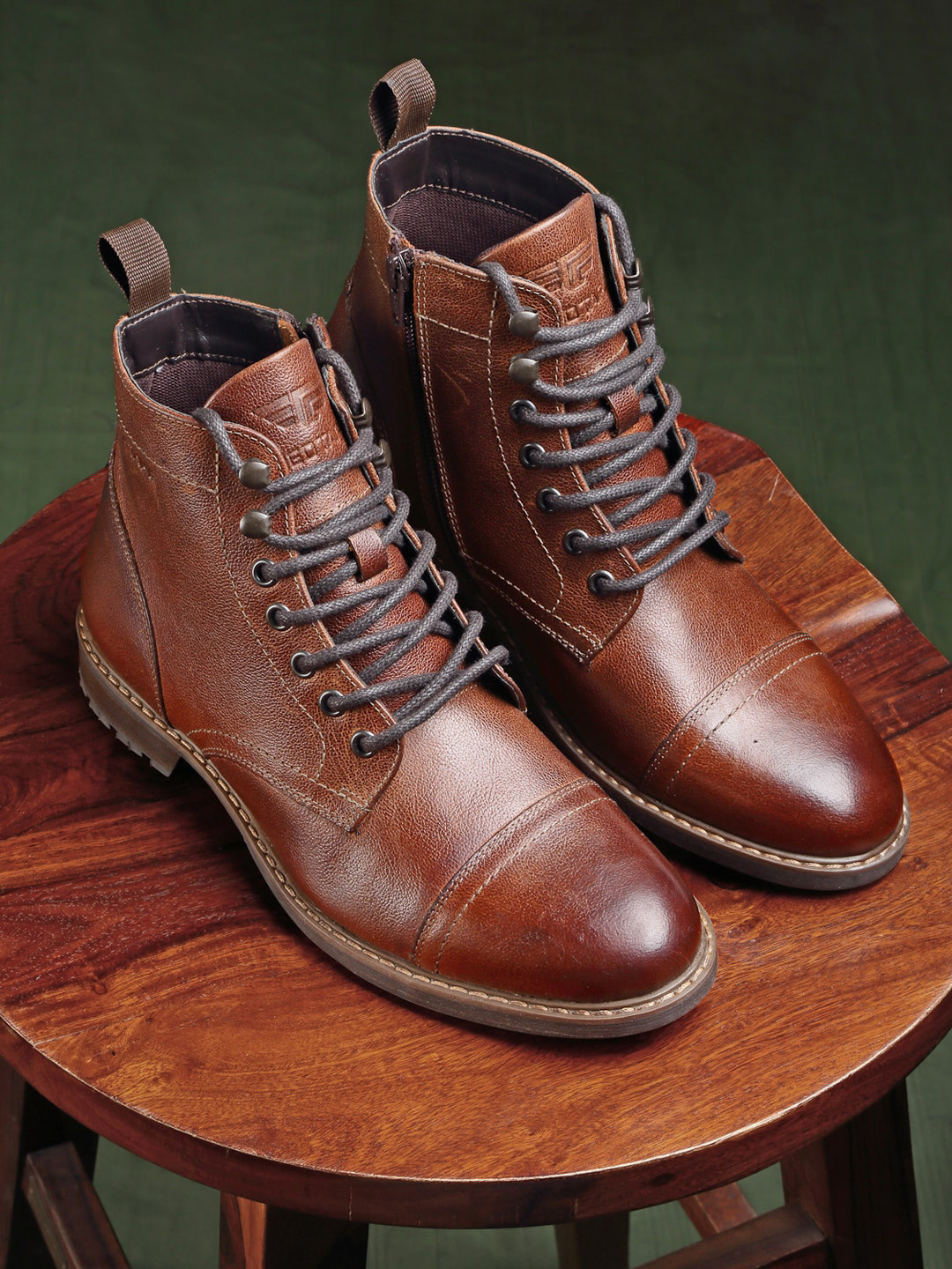 Buy Red Tape Men Brown Solid Mid Top Leather Biker Boots - Boots for ...