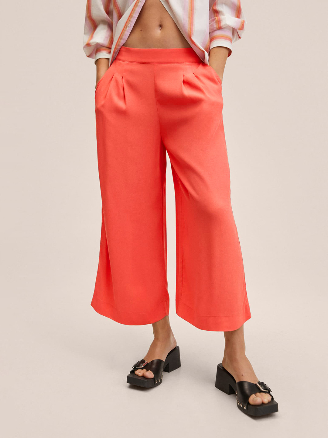 Buy MANGO Women Coral Pink Solid Flared Pleated Culottes Trousers ...
