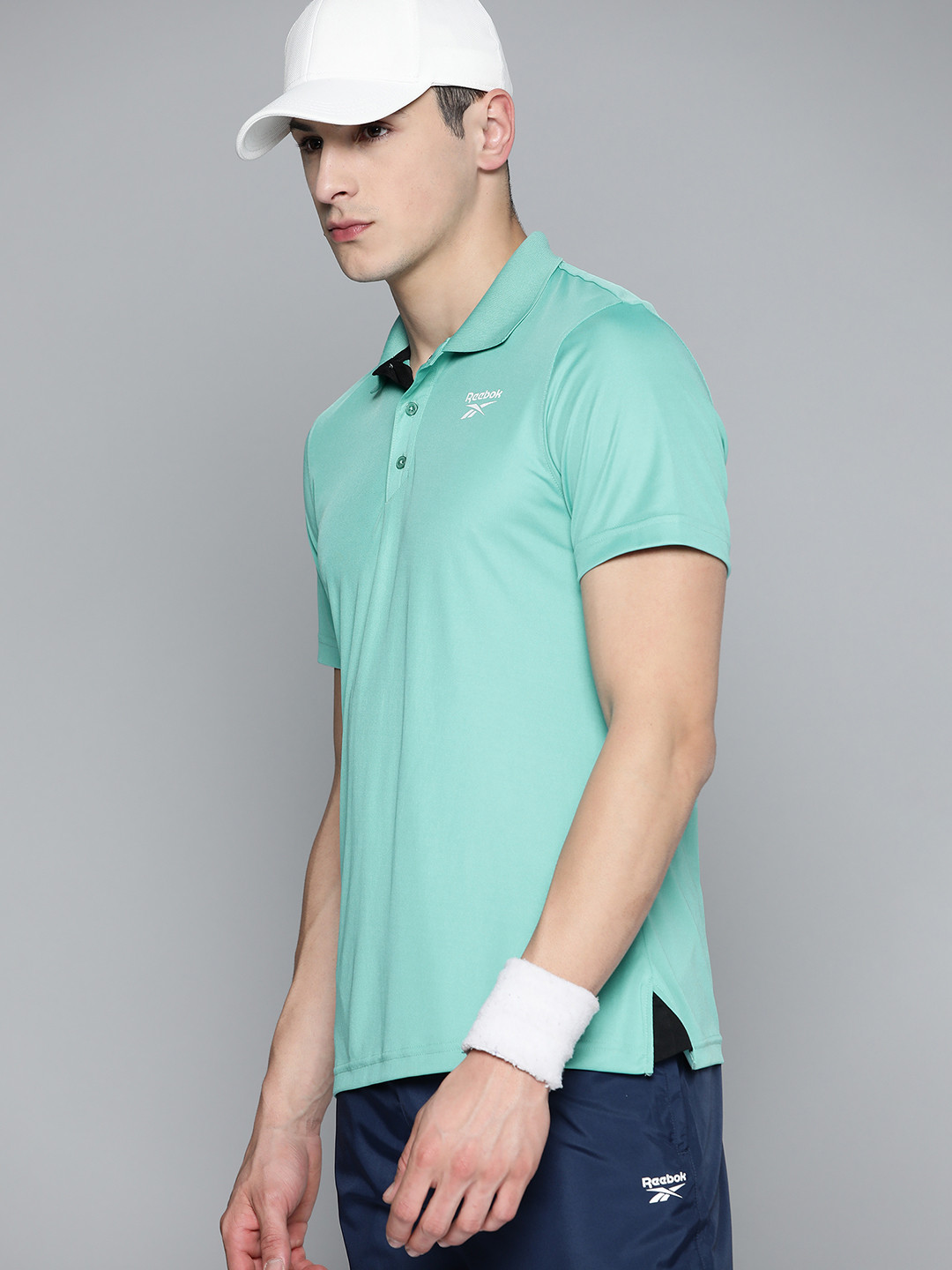 Buy Reebok Men Brand Logo Printed Polo Collar Speedwick Training T ...