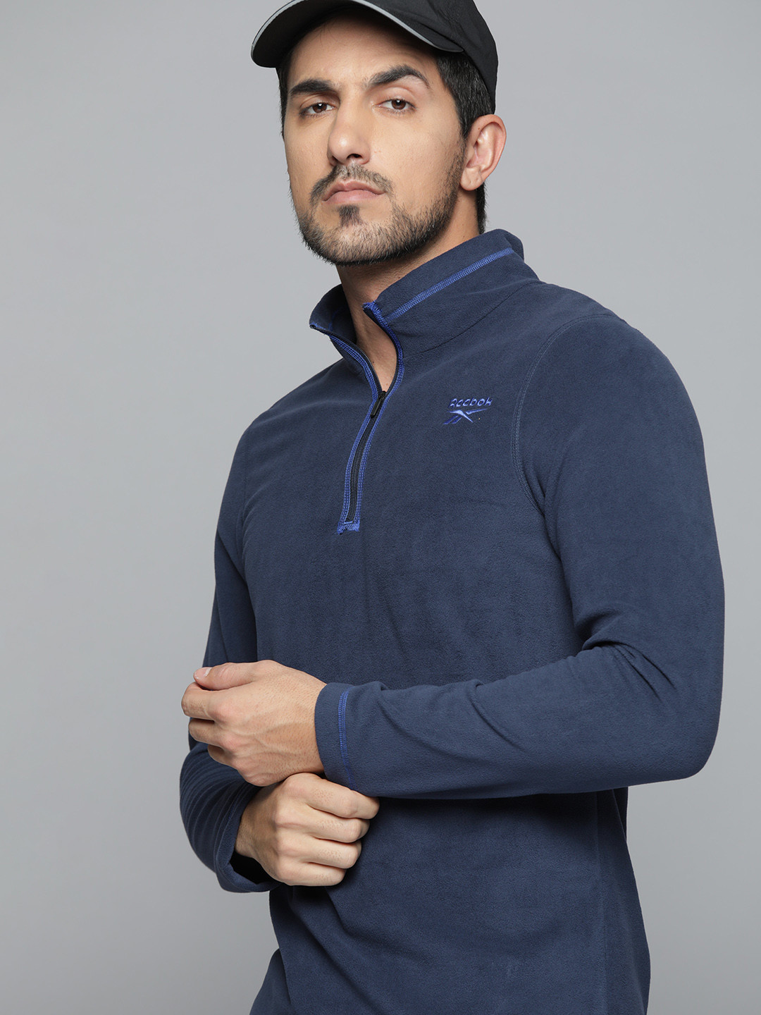 Buy Reebok Men Navy Blue Solid Fleece Quarter Sporty Jacket - Jackets ...