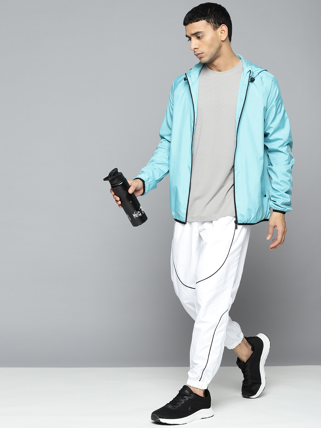 Buy HRX By Hrithik Roshan Men Blue Solid Running Sporty Jacket ...