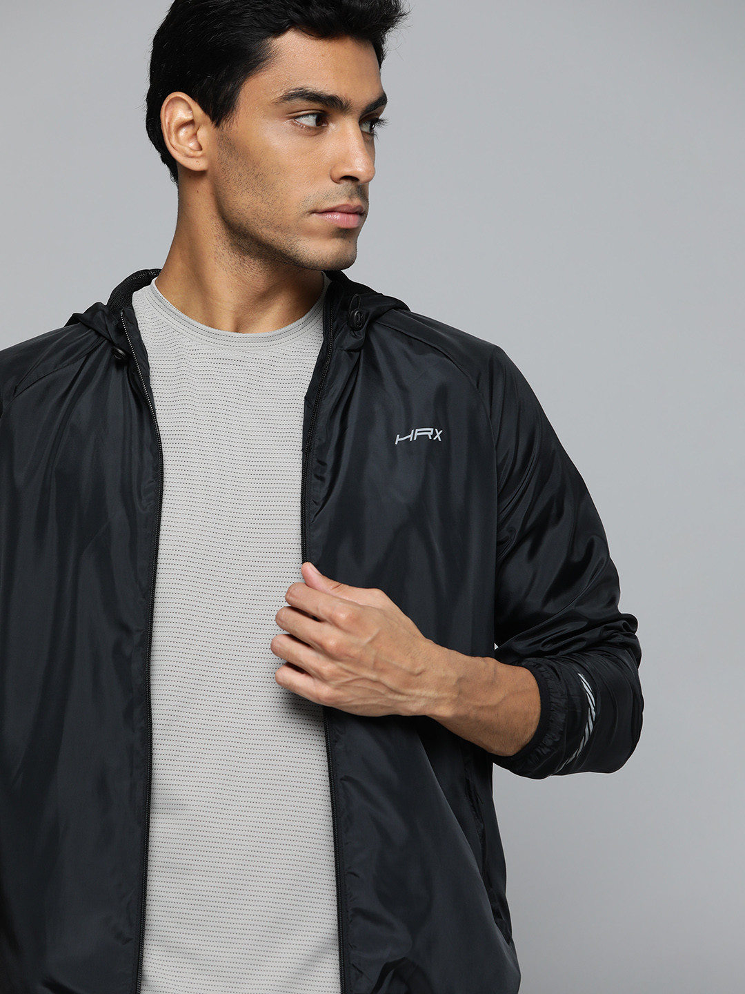 Buy HRX By Hrithik Roshan Men Black Solid Rapid Dry Running Sporty ...