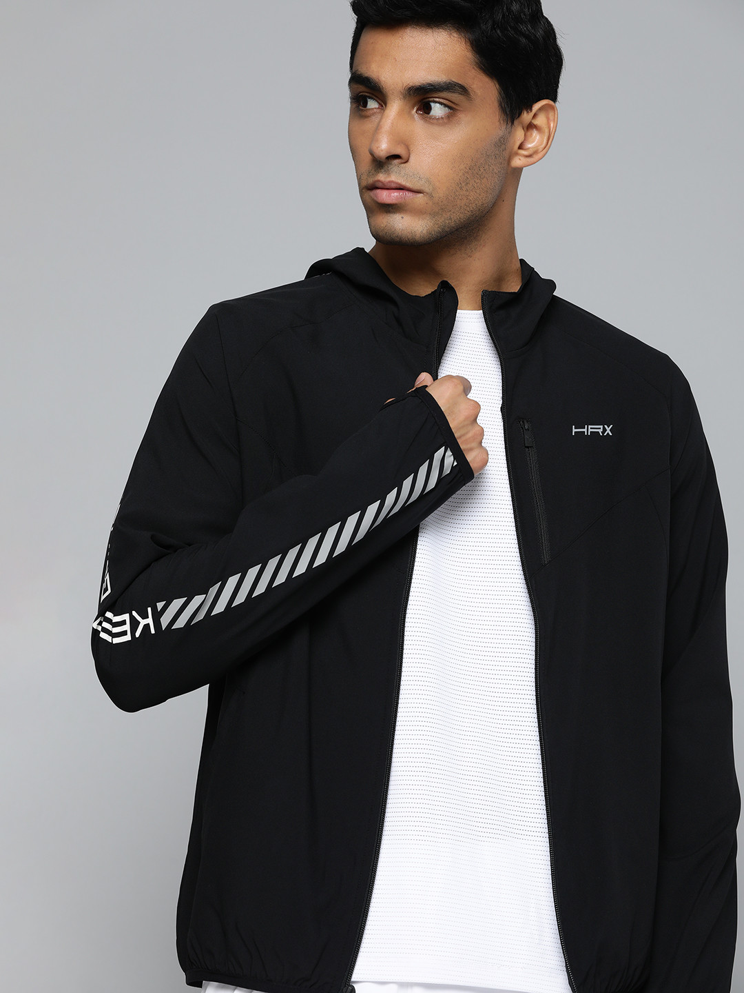 Buy HRX By Hrithik Roshan Men Black Solid Rapid Dry Running Sporty ...