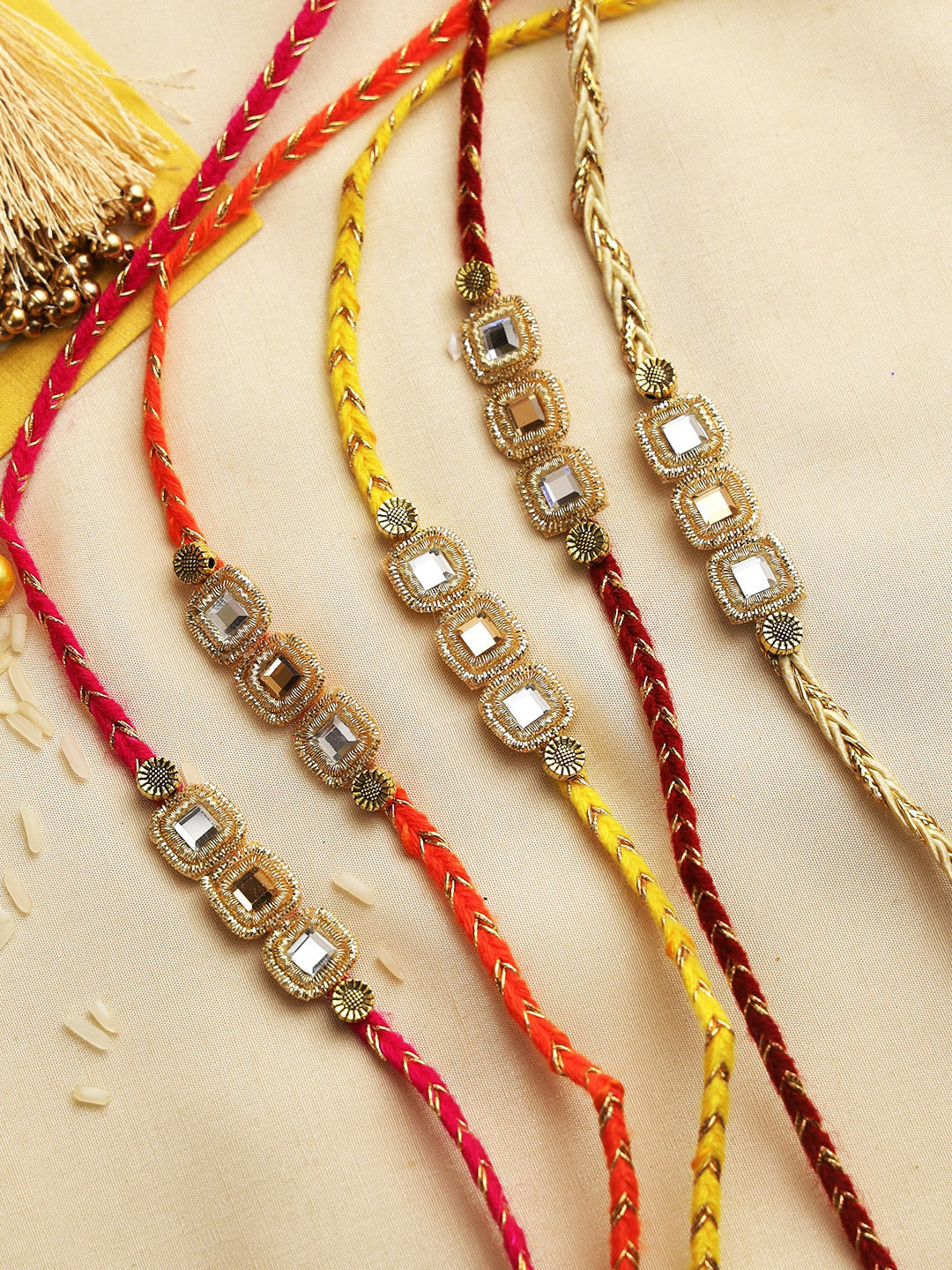 Buy Aapno Rajasthan Pack Of 5 Multicoloured Rakhi With Roli Chawal Set ...