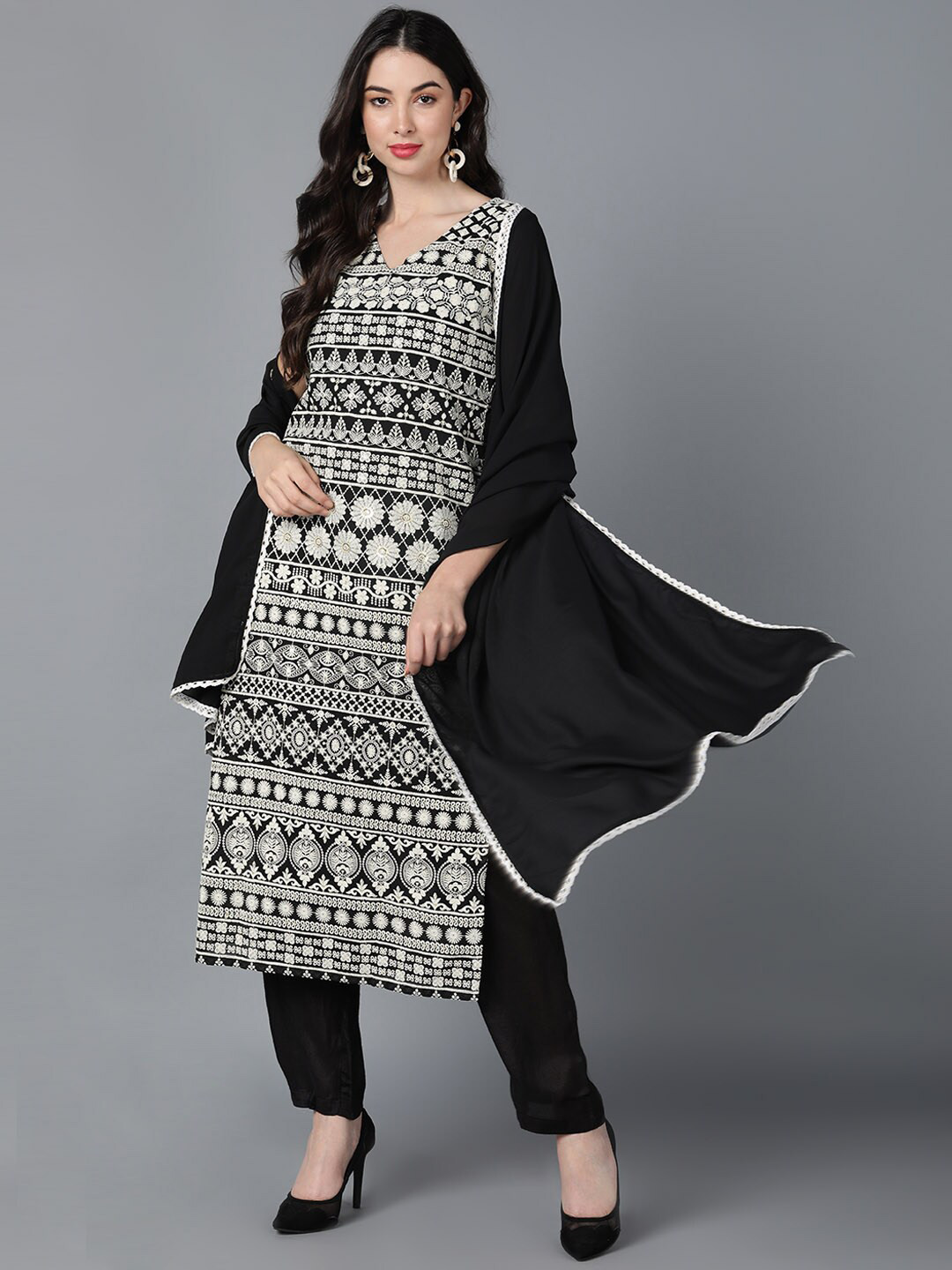 Buy AHIKA Women Black Floral Printed High Slit Kurti With Trousers ...