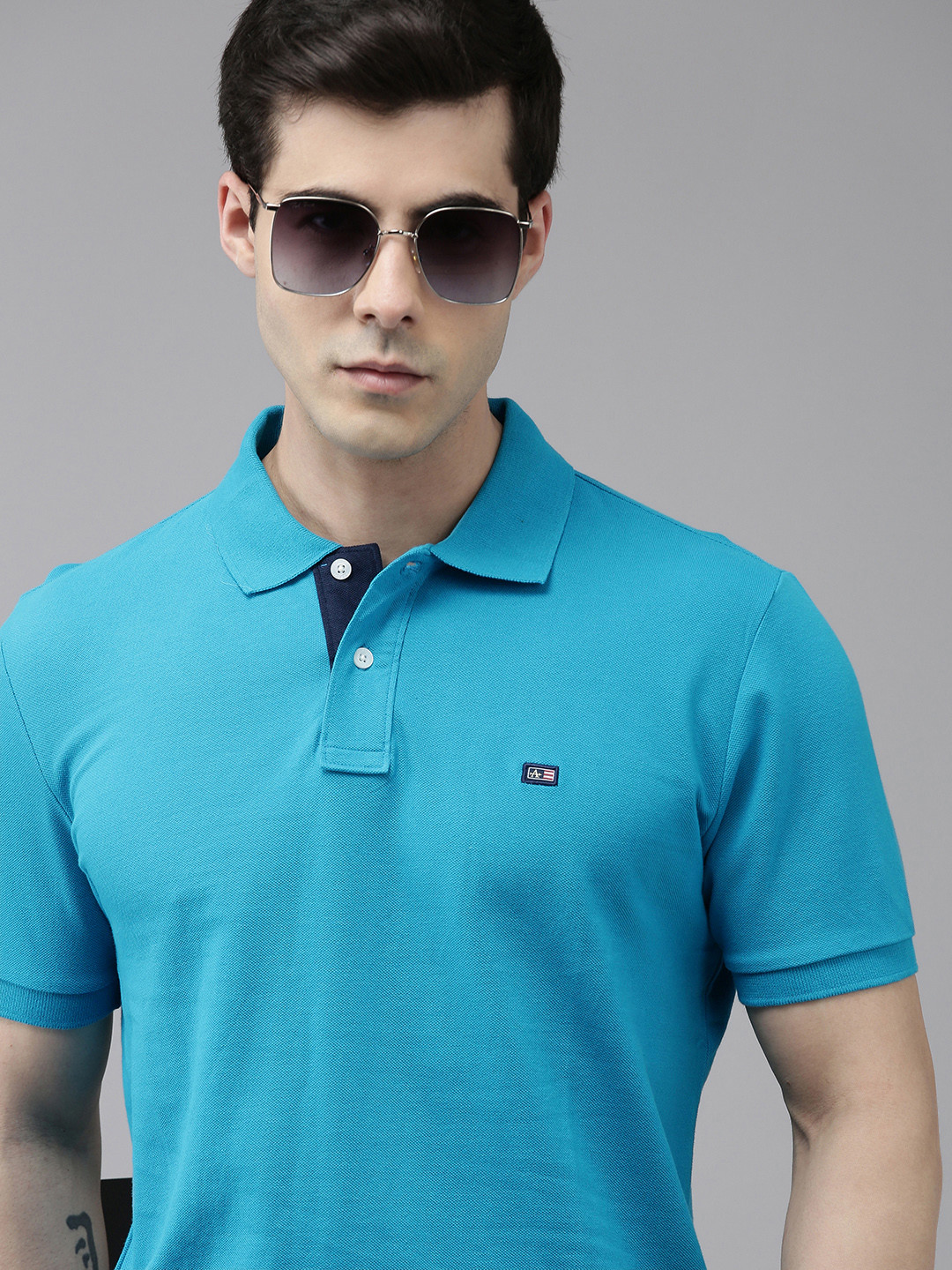 Buy Arrow Men Solid Polo Collar Indigo Knitted Pure Cotton T Shirt With ...