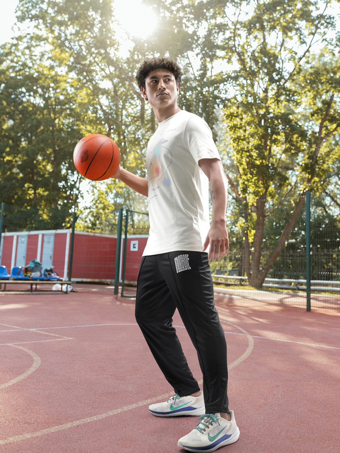 Buy Nike Men Black Brand Logo Printed Mid Rise Dry Fit Basketball Track ...
