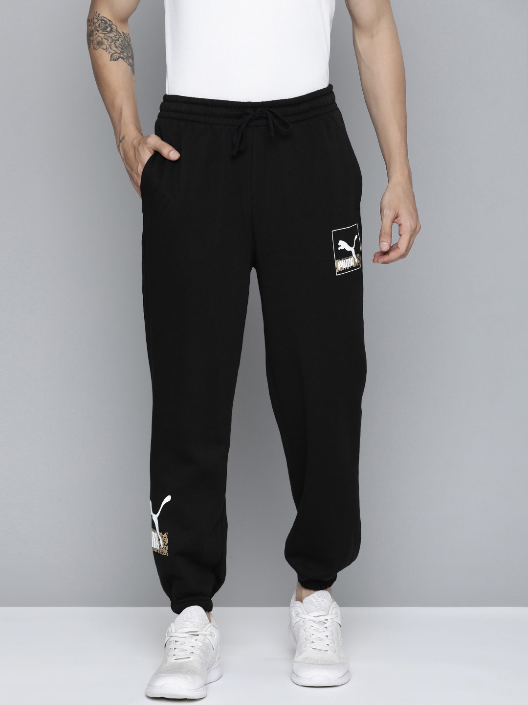 Buy Puma Men Black Printed Relaxed Fit Brand Love Joggers - Track Pants ...