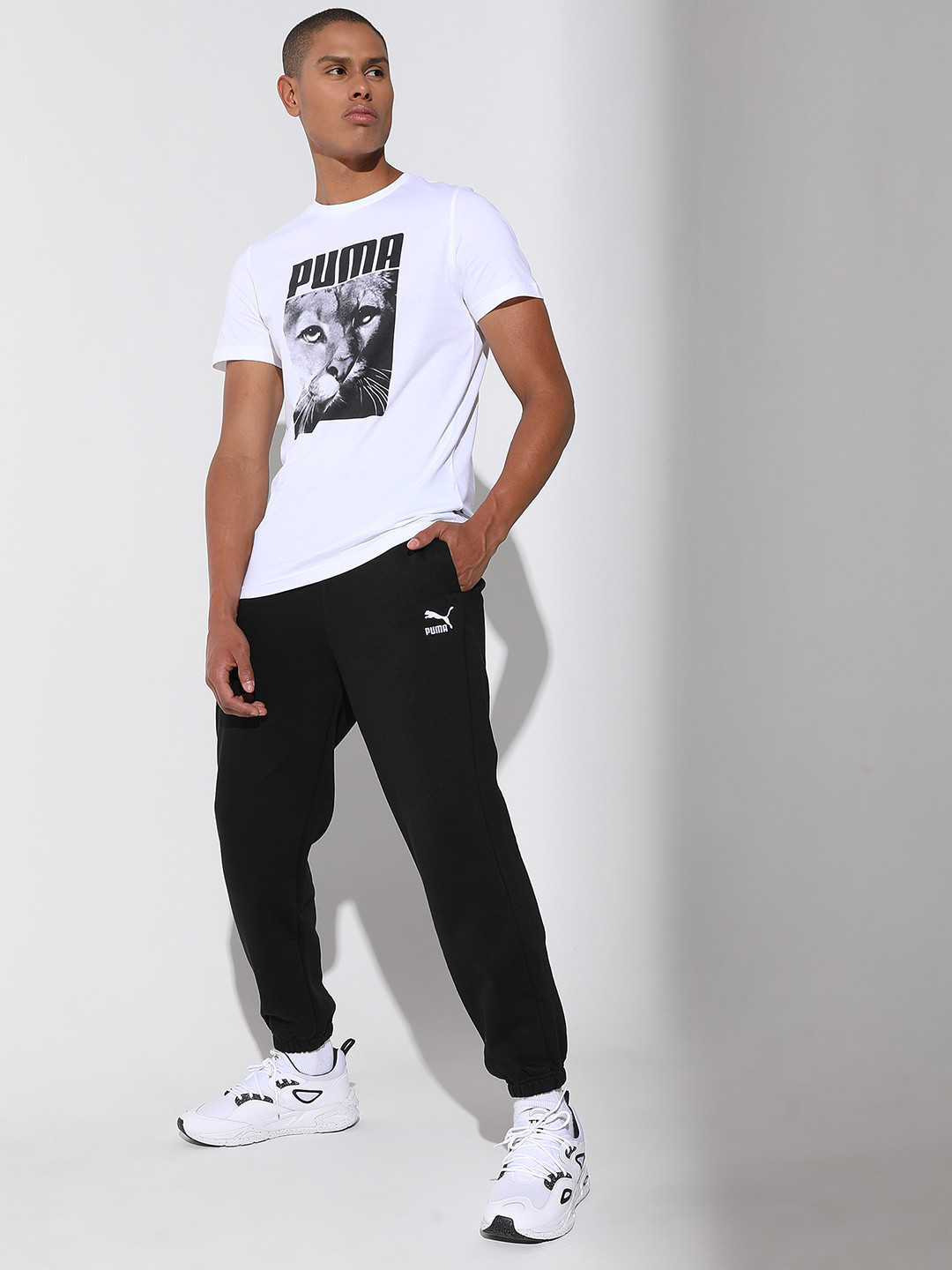 Buy Puma Men Black Solid Relaxed Fit Classics Joggers - Track Pants for ...