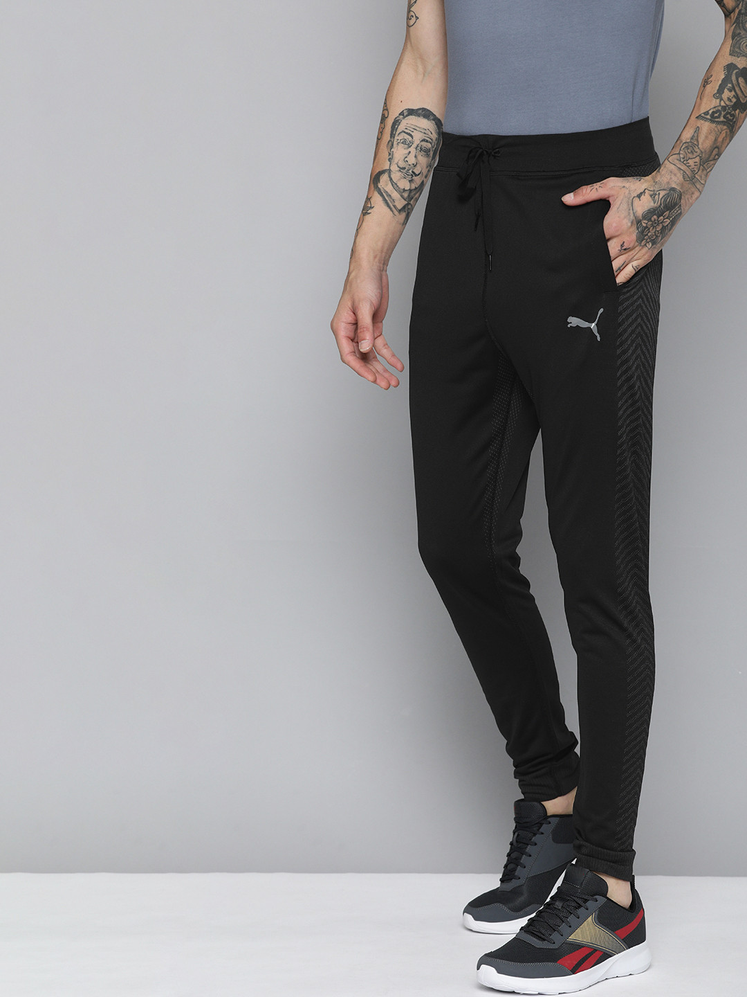 Buy Puma Men Brand Logo Printed Slim Fit FORMKNIT SEAMLESS Joggers With ...